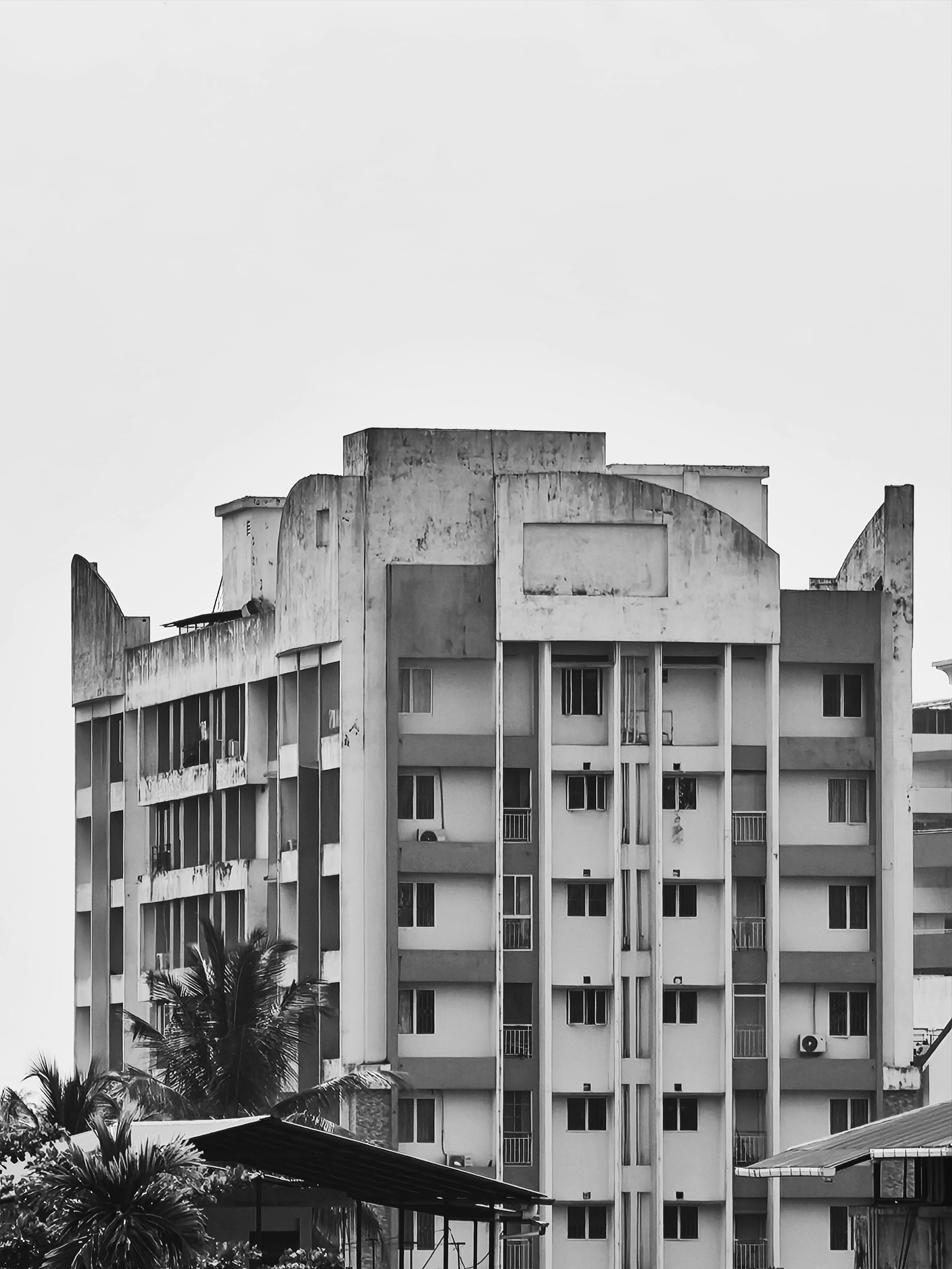 Monolithic Edges: A Crystallized Apartment Block in Monochrome