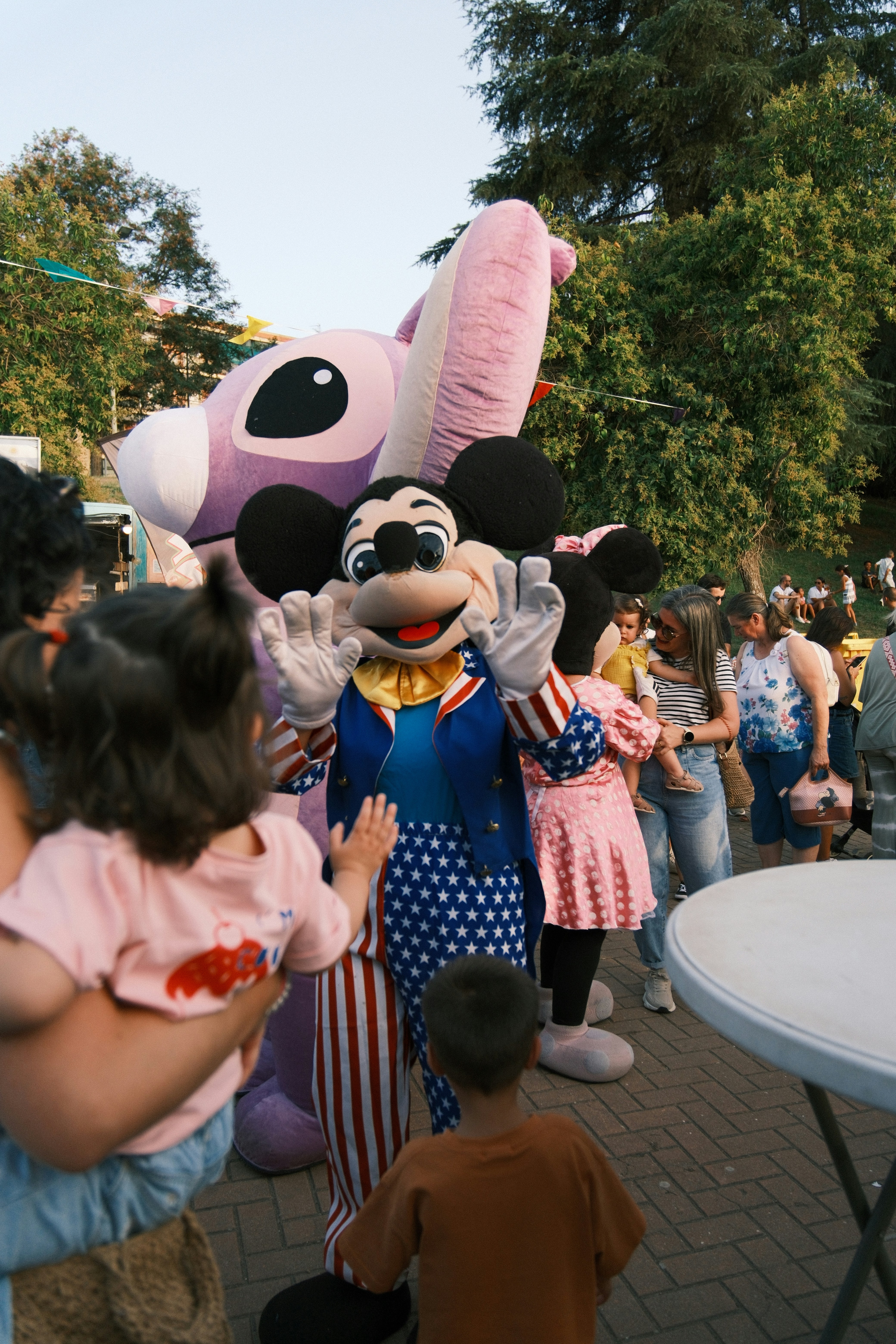 Mickey in a Crowd: Front-and-Center with a Cheerful Parade of Fans