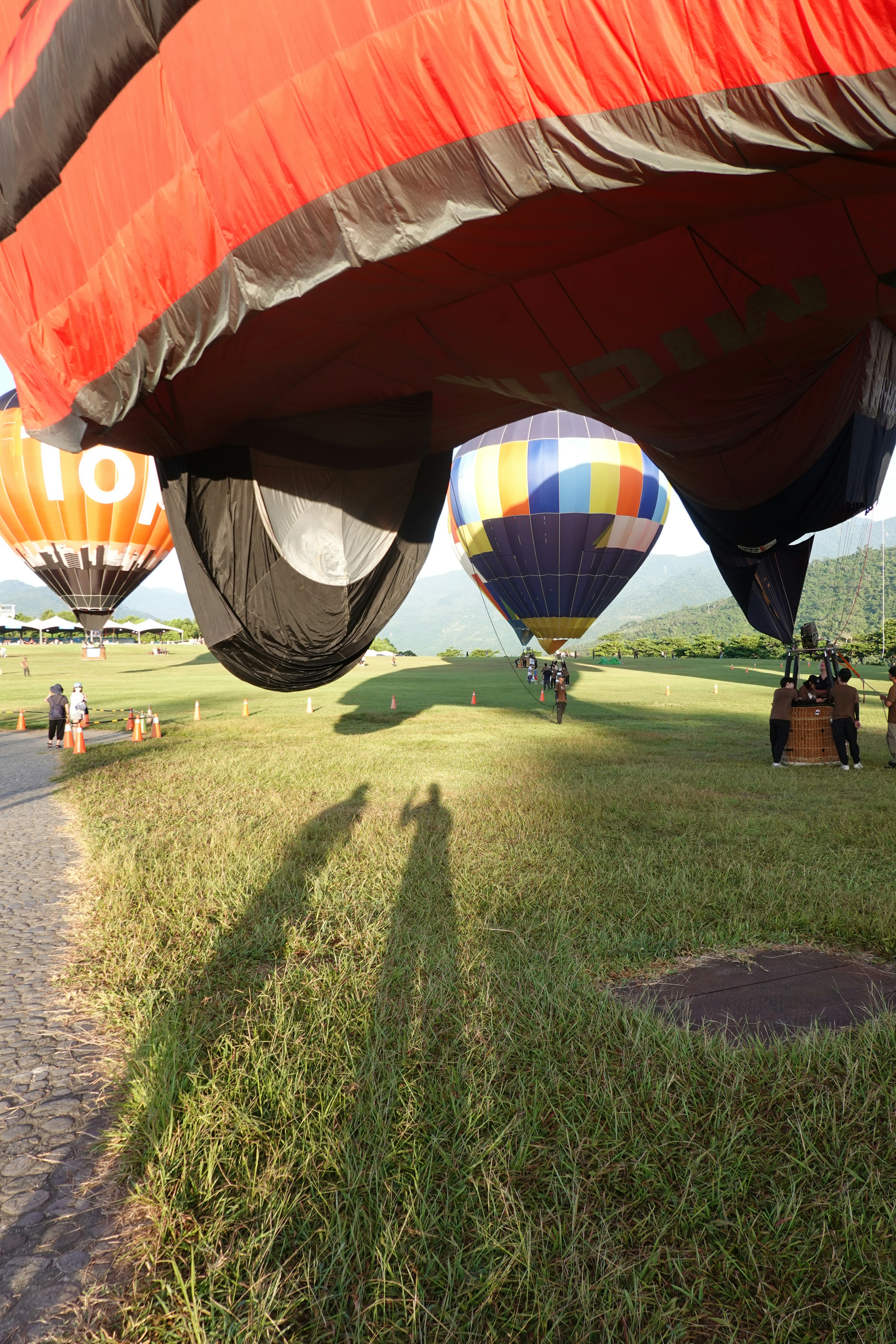 Under the Big Orange Canopy: Balloons Ready for Lift-Off