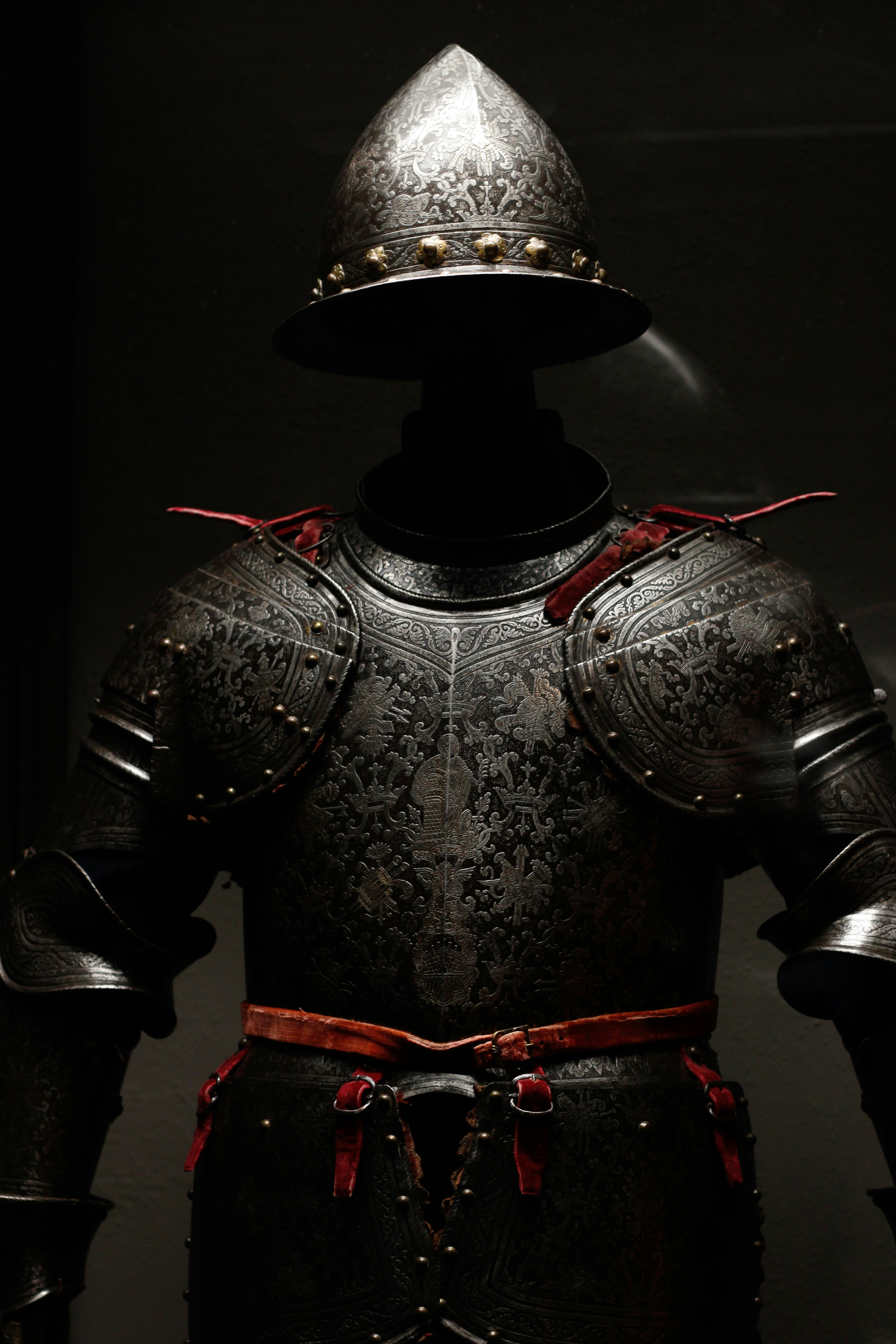 Armored Silence: A Dark Silhouette in Ornate Plate