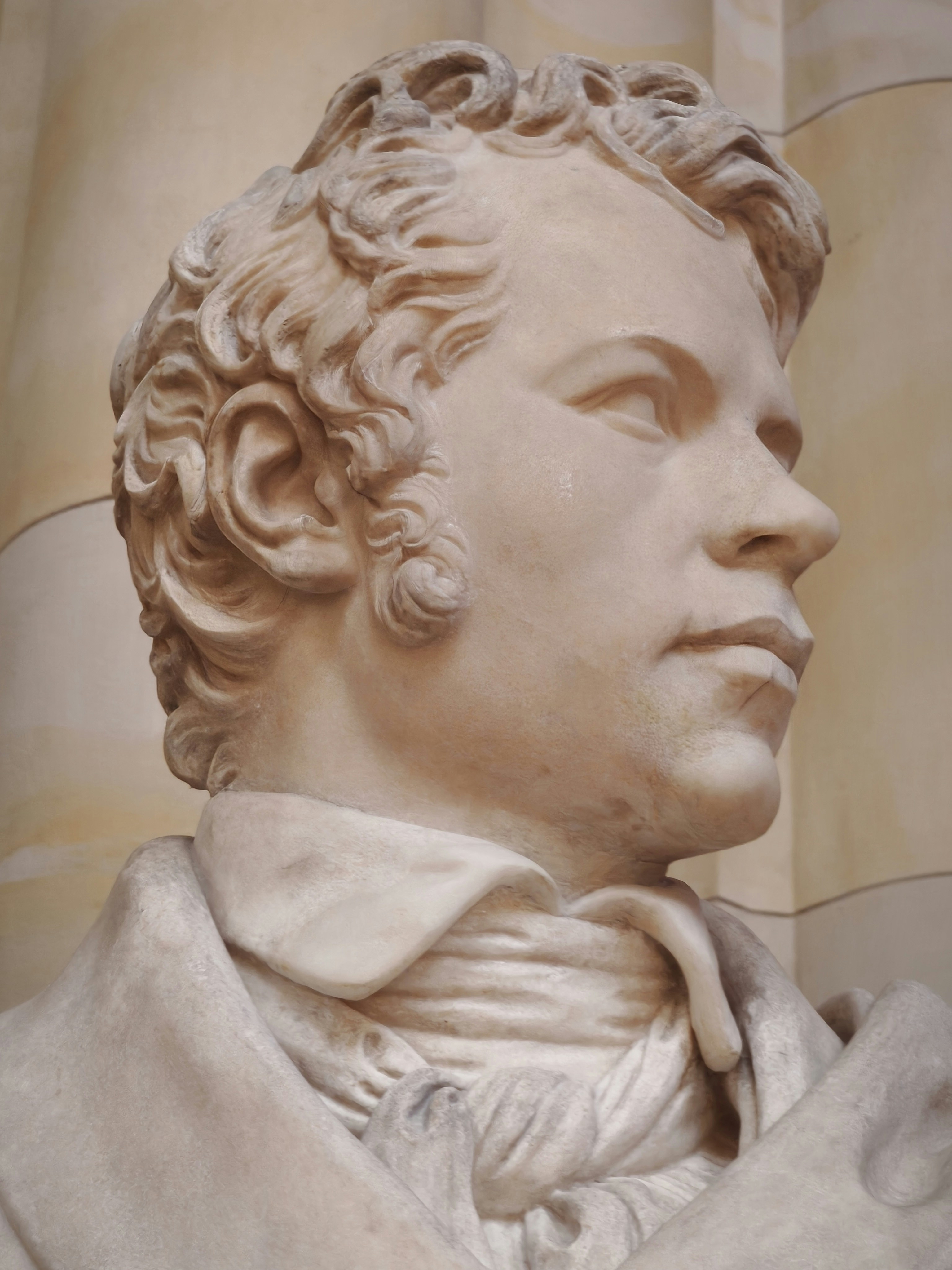Stone Gaze: Bust of the Classical Muse in Soft Light