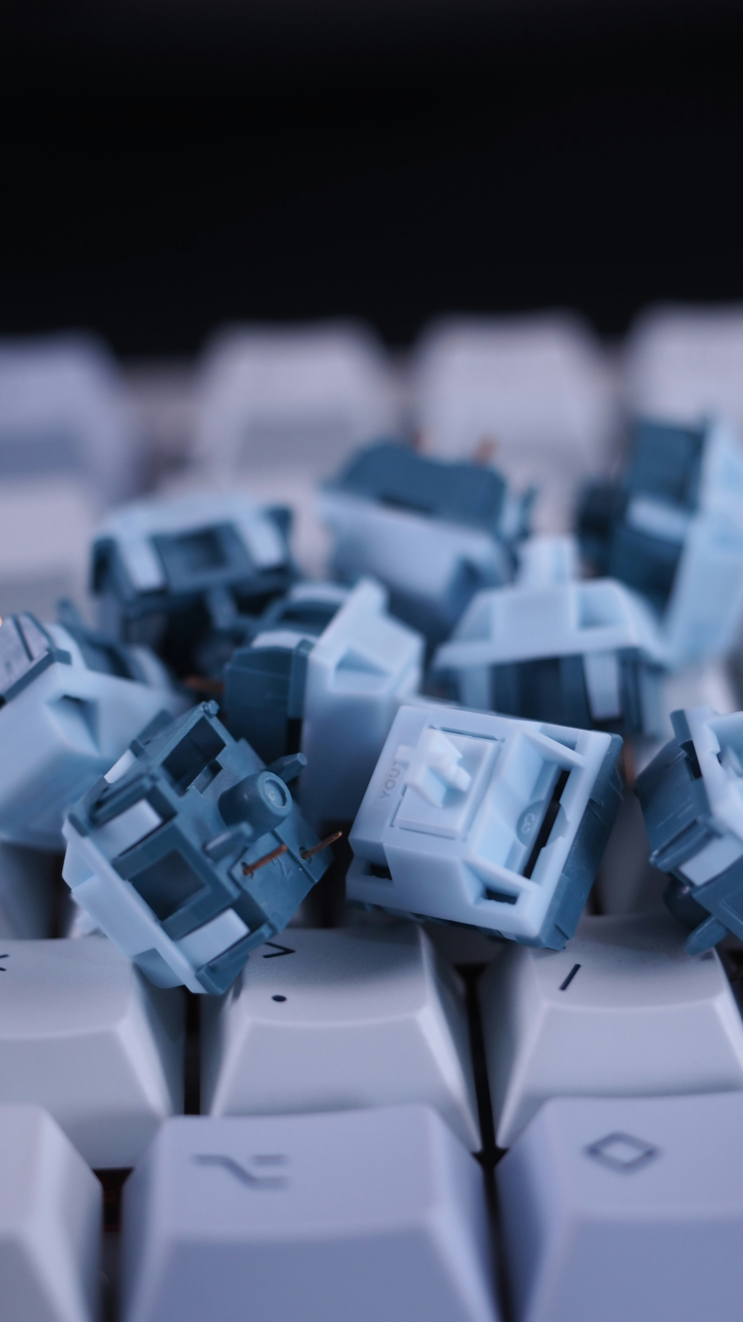 Blue Mechanical Keys in a Sea of White