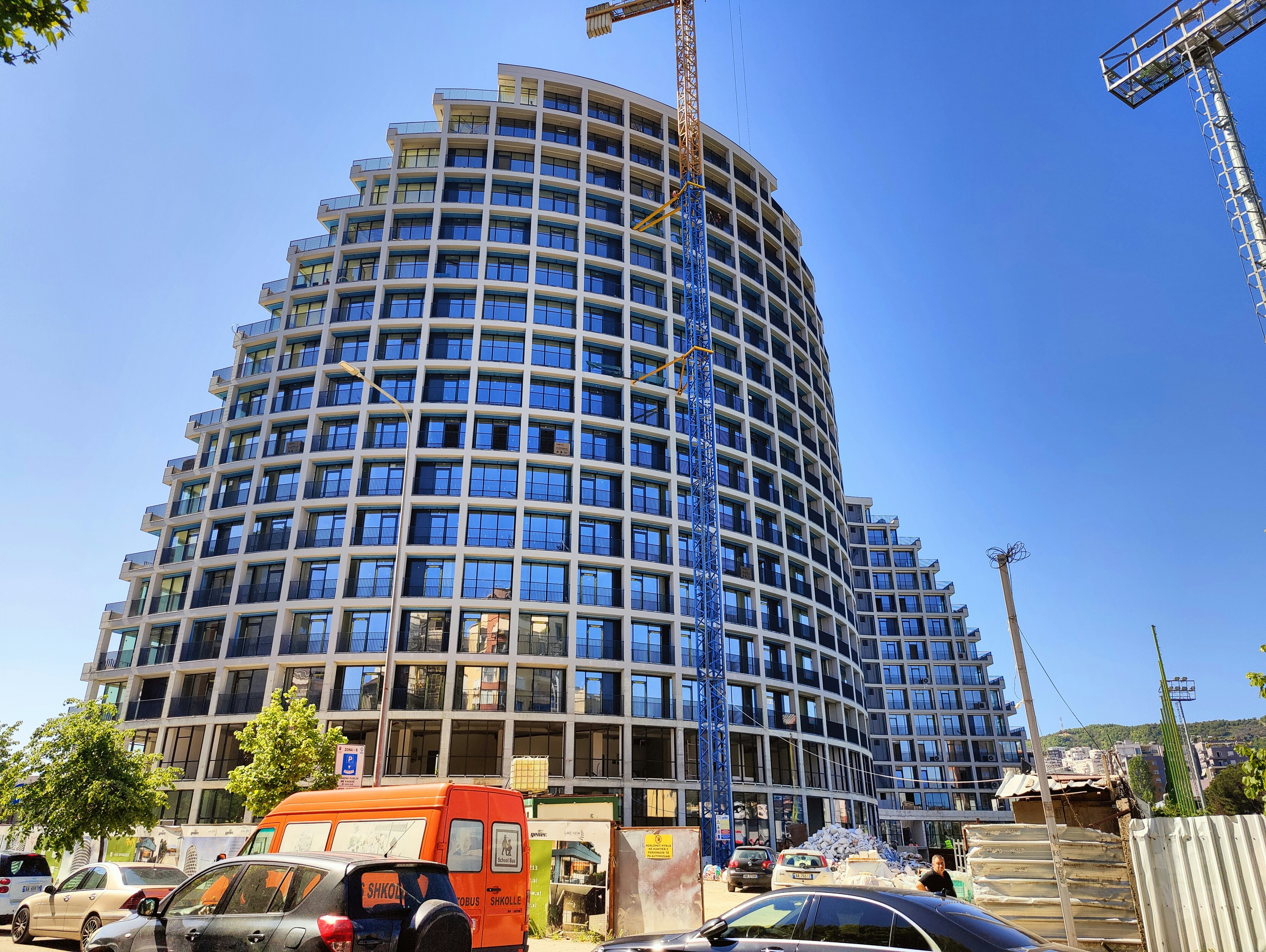 Crane Overrise: A Curved Glass Facade Meets Skyward Steel
