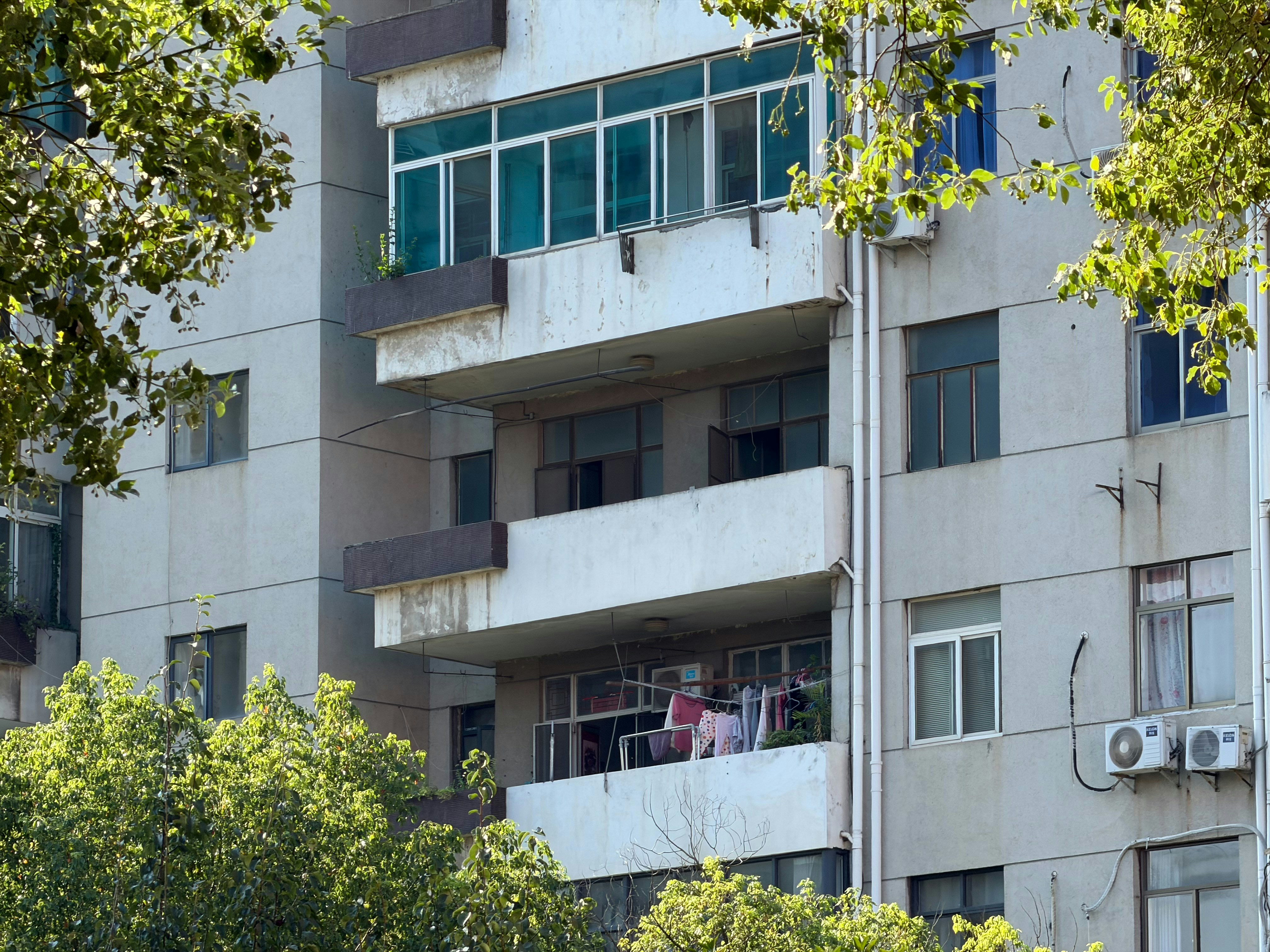 Balconies in a Quiet Concrete Facade
