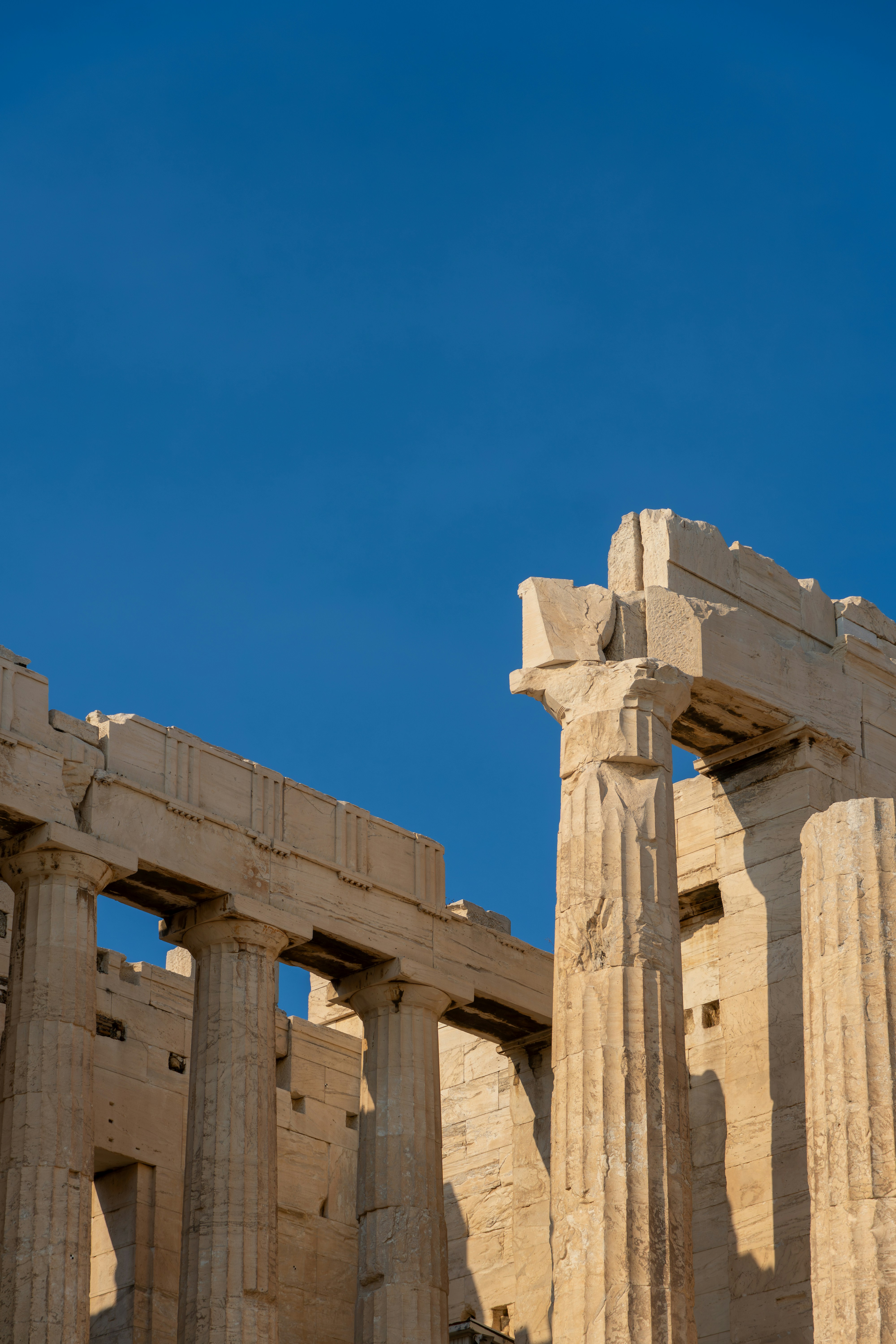 Stone Colonnade Under a Cerulean Sky