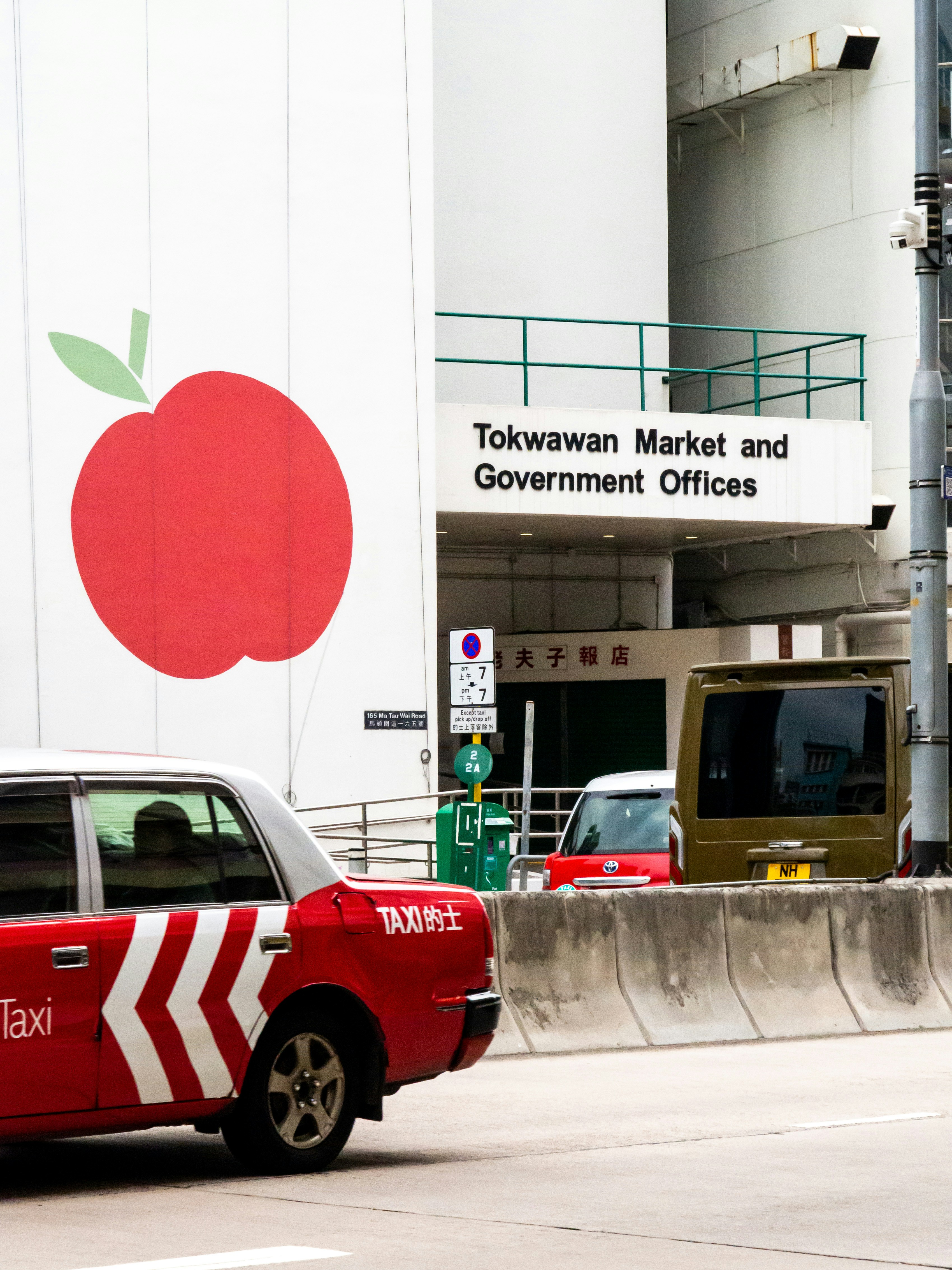 Red Taxi at the Entrance of Tokwanan Government Offices