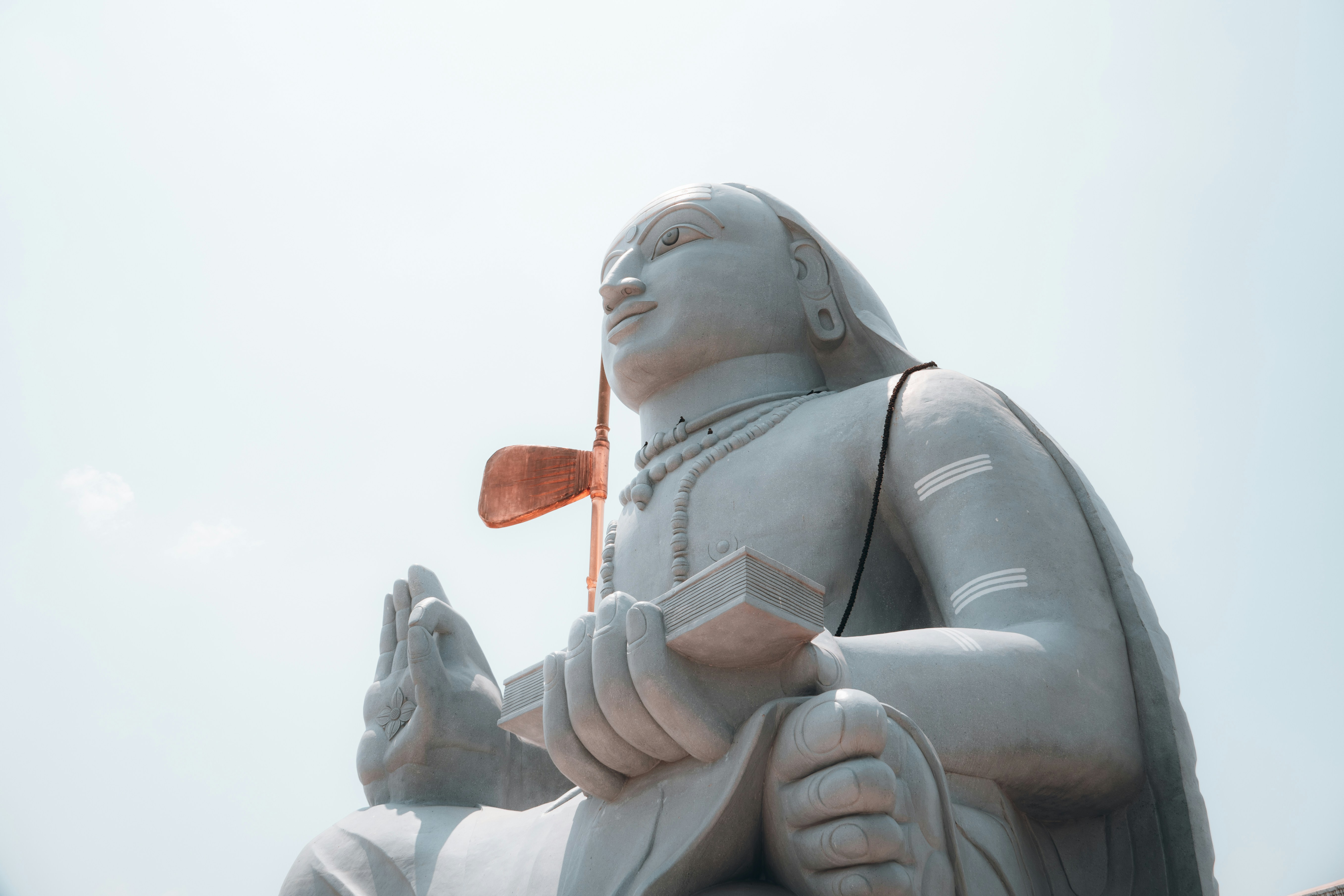 Stone Reverie: A Meditative Pose Under a Wide Sky