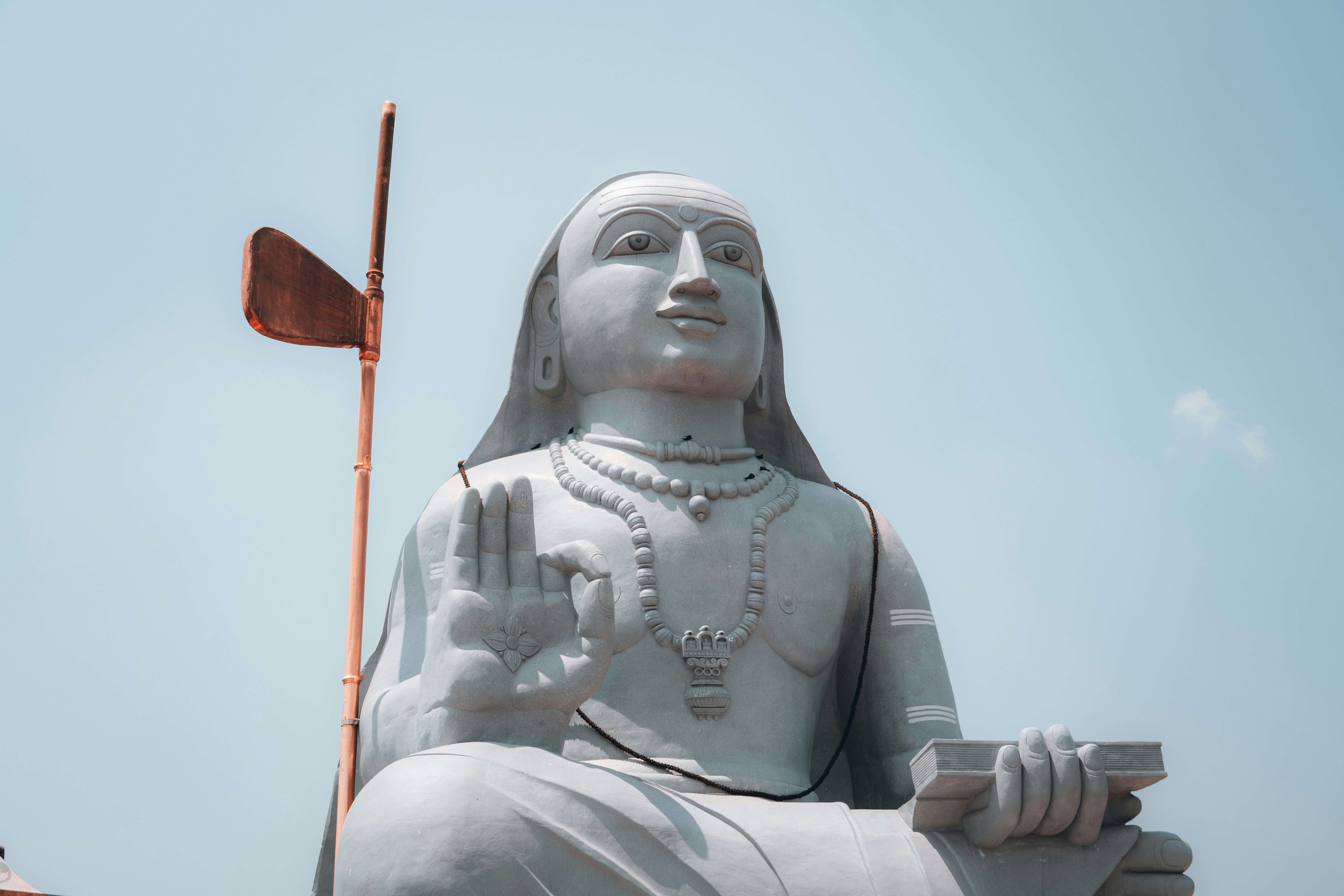 Serene Buddha: A Quiet Gaze Beneath a Clear Sky