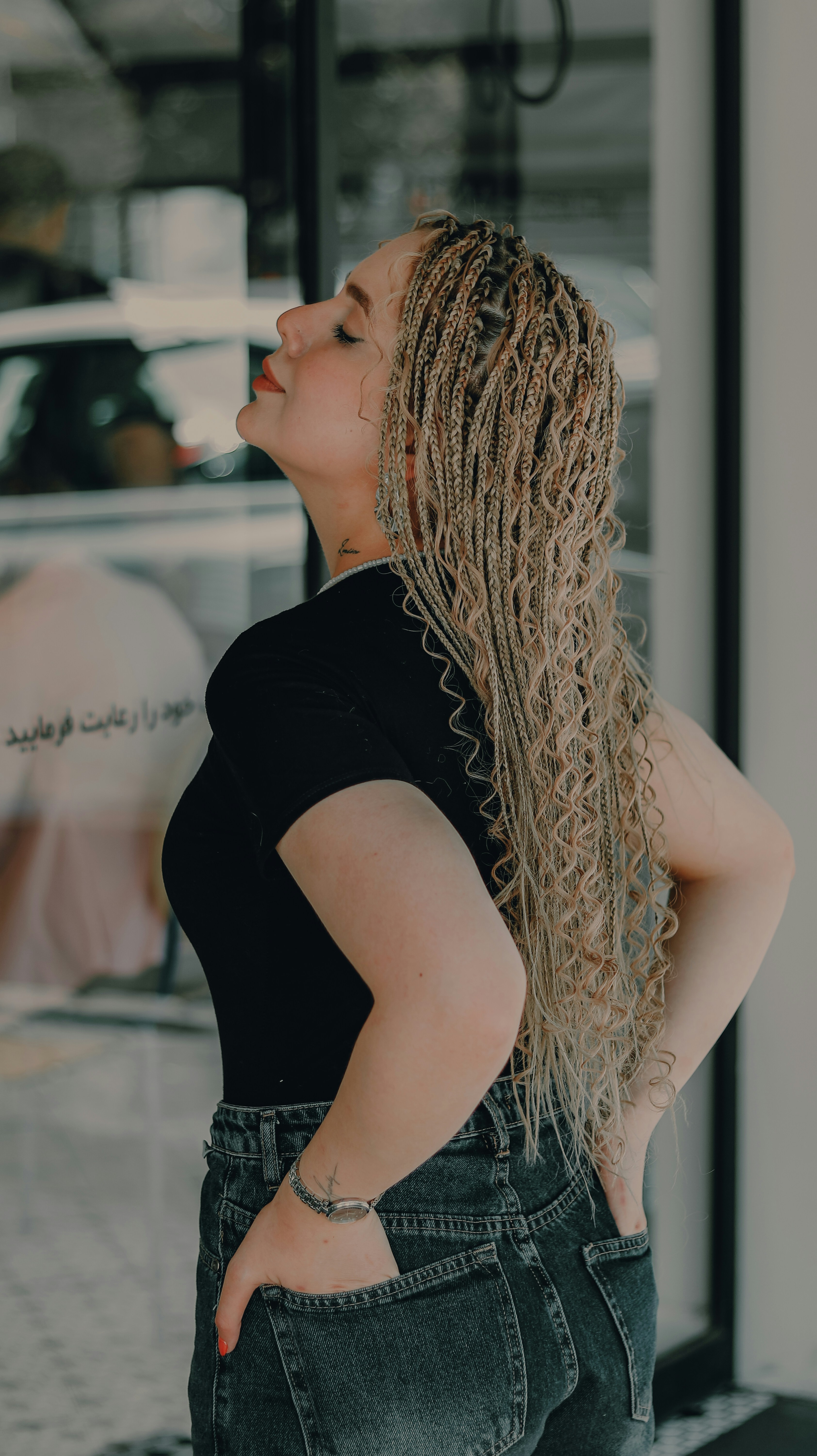 Portrait in Profile: Braided Locks and Silhouetted Confidence