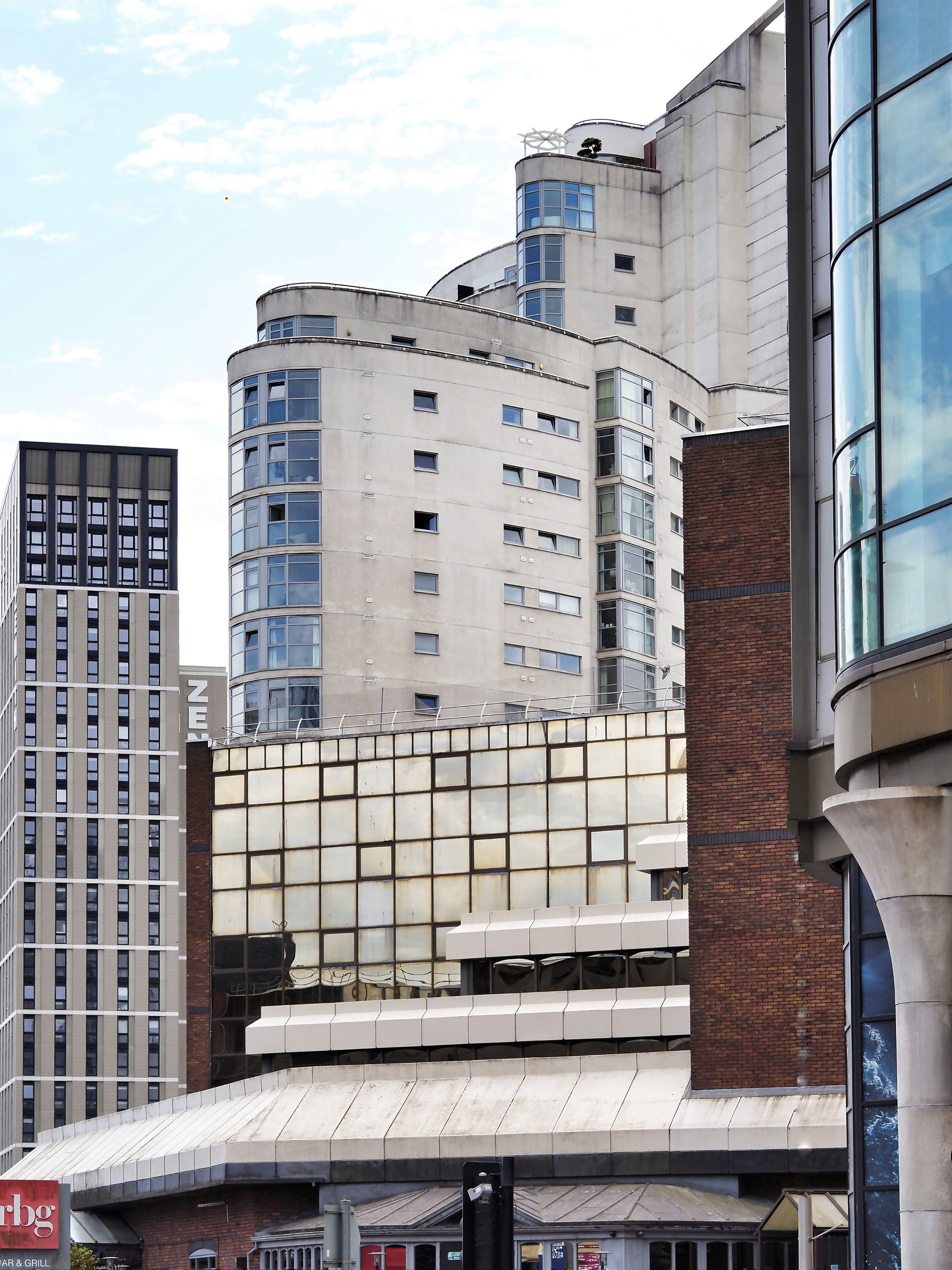 Curtain of Glass and Brick: Urban Facade Convergence