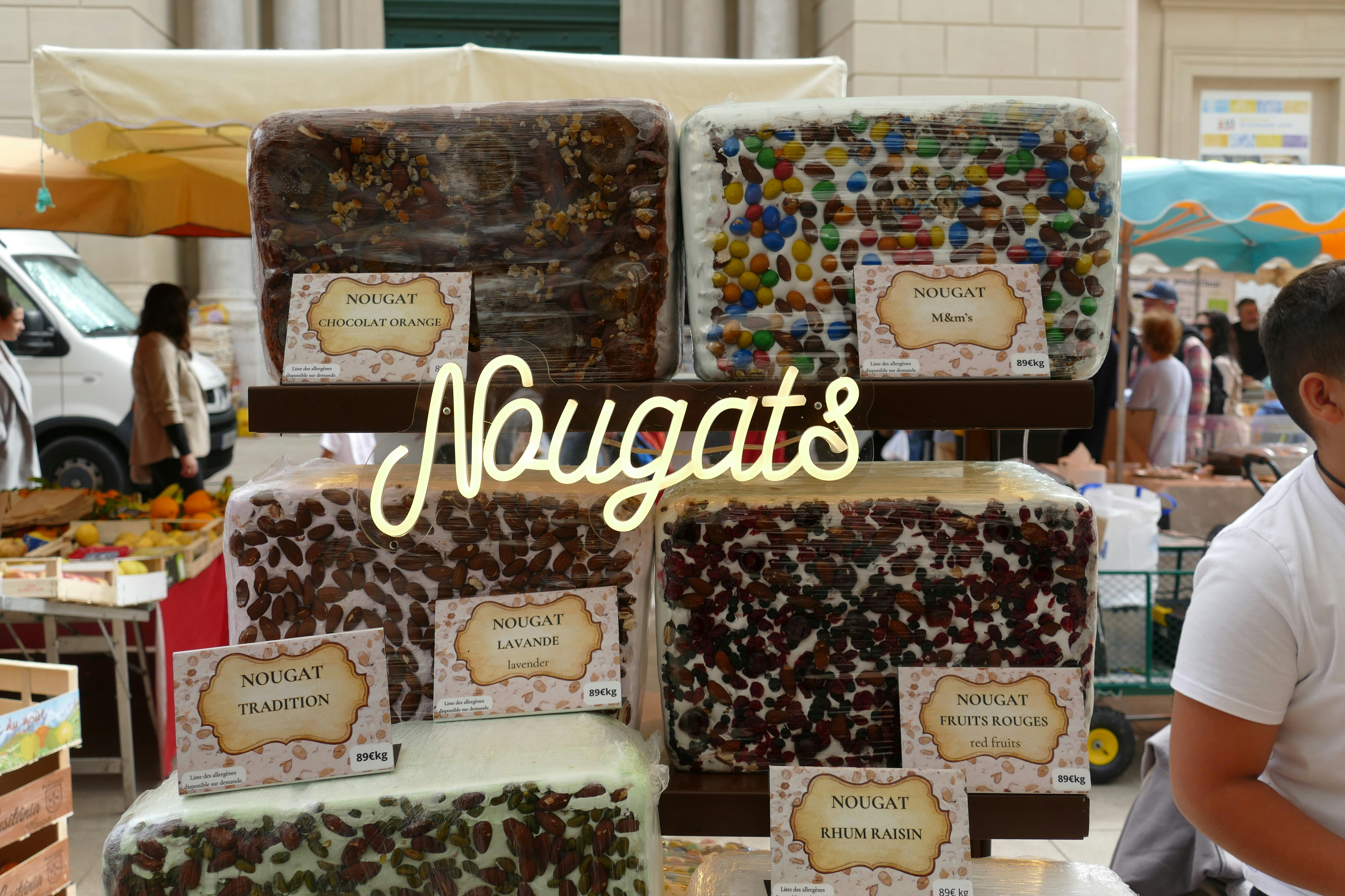 Nougat Display at a Busy Outdoor Market
