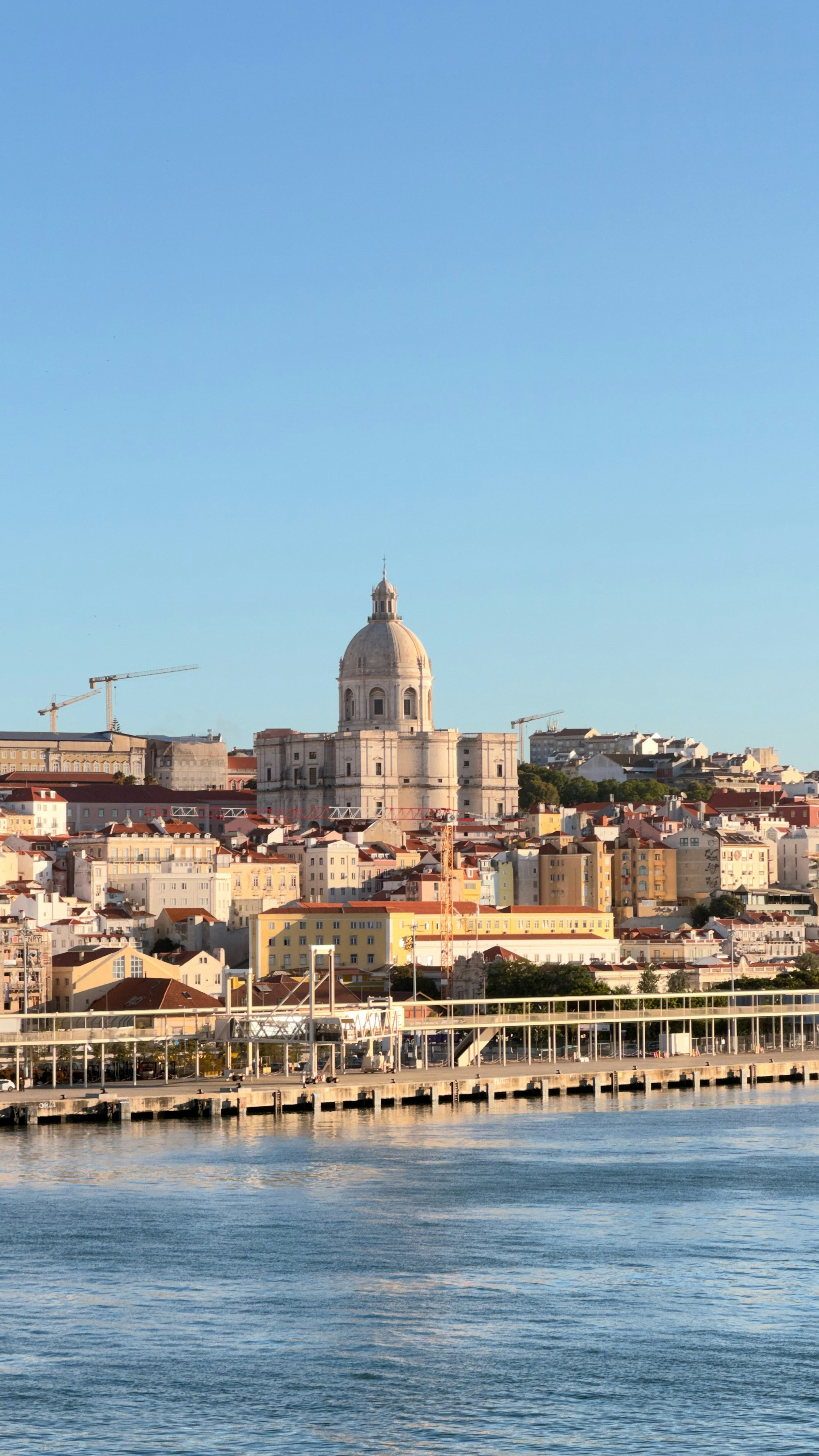 Domed Cathedral Rising Above a Coastal City
