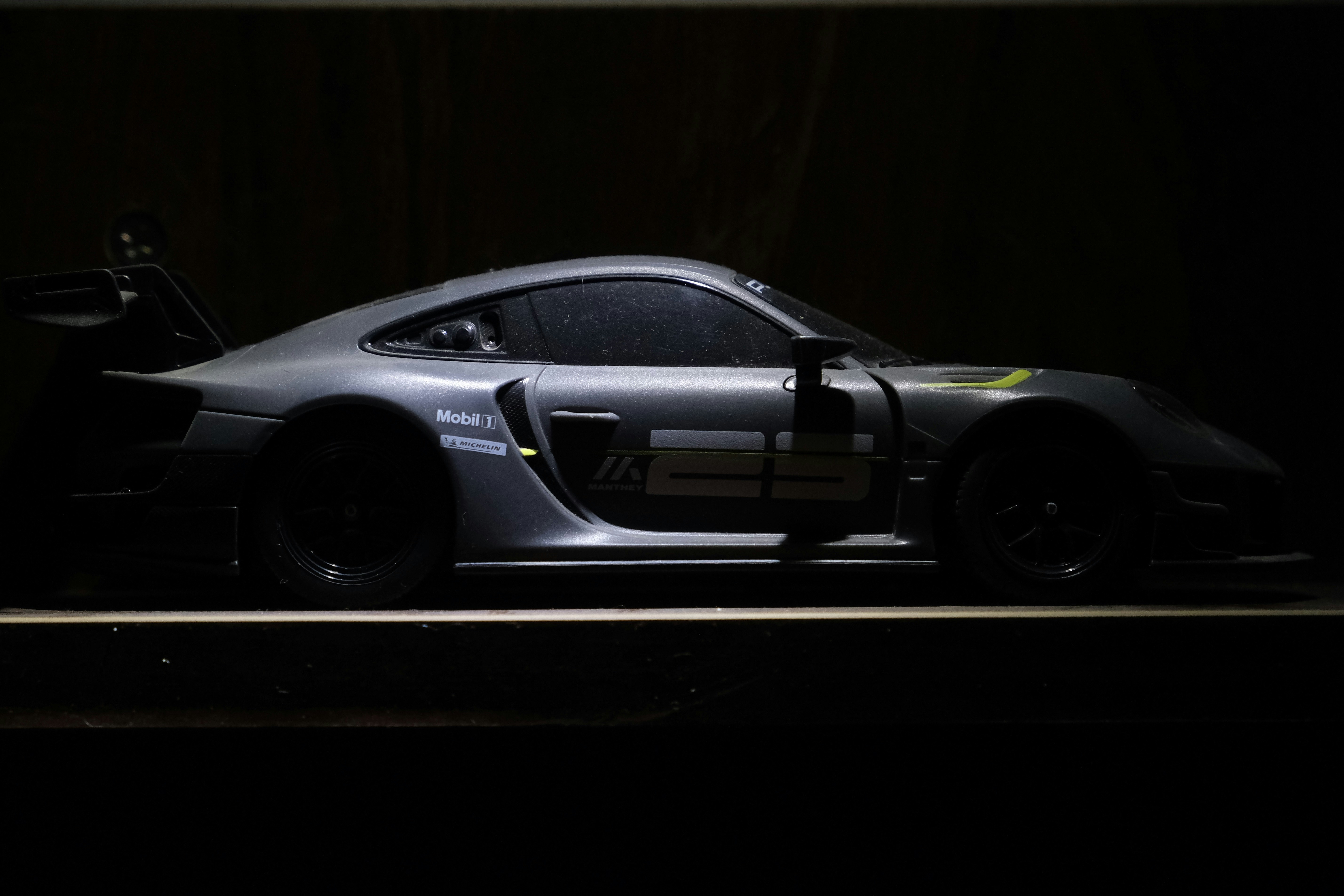 Midnight Silver: A Racecar Emerges from the Shadows