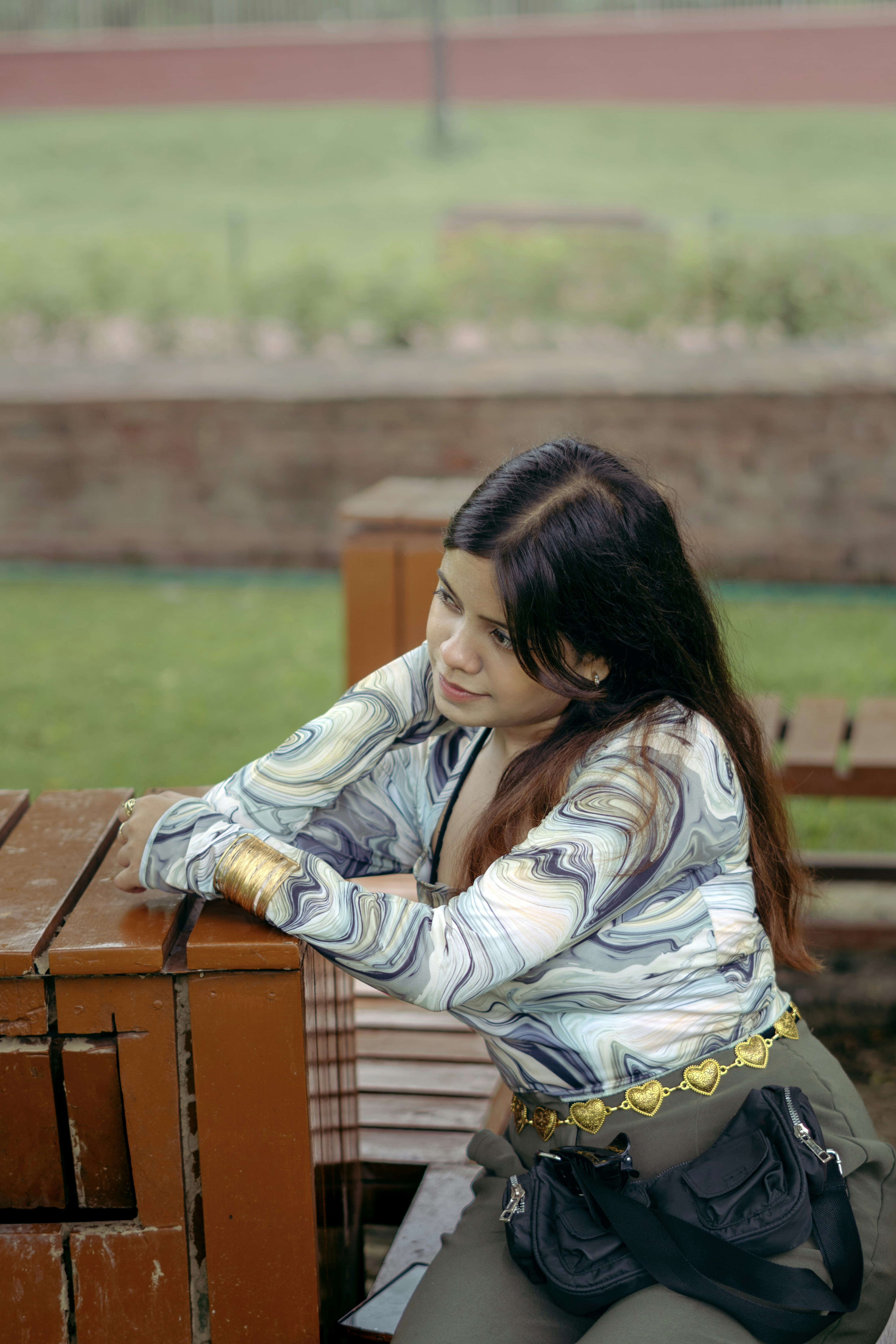Portrait on a Park Bench with Marble-Patterned Sleeve