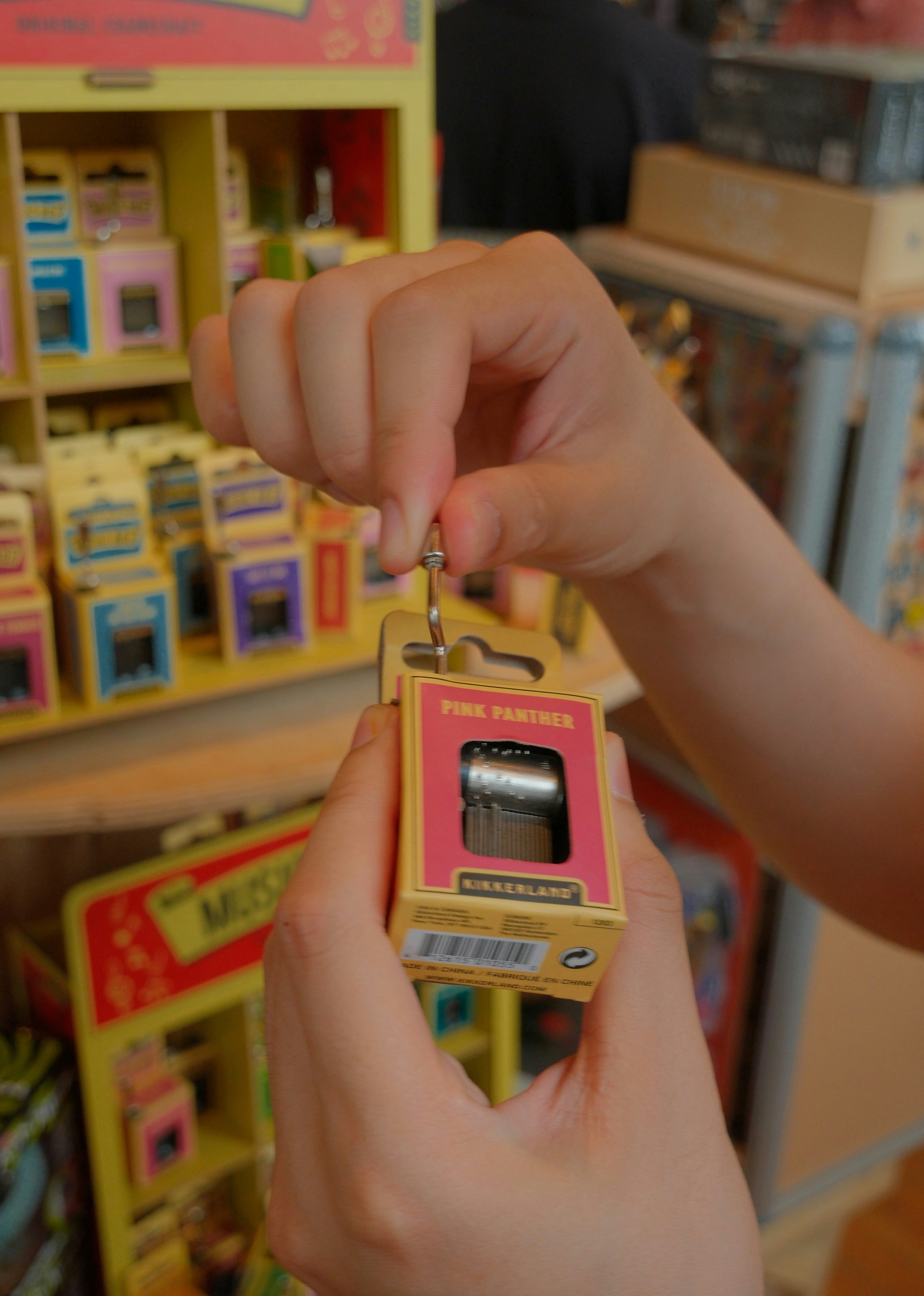 Tiny Key, Big Find: A Shopper's Close-Up on a Miniature Package