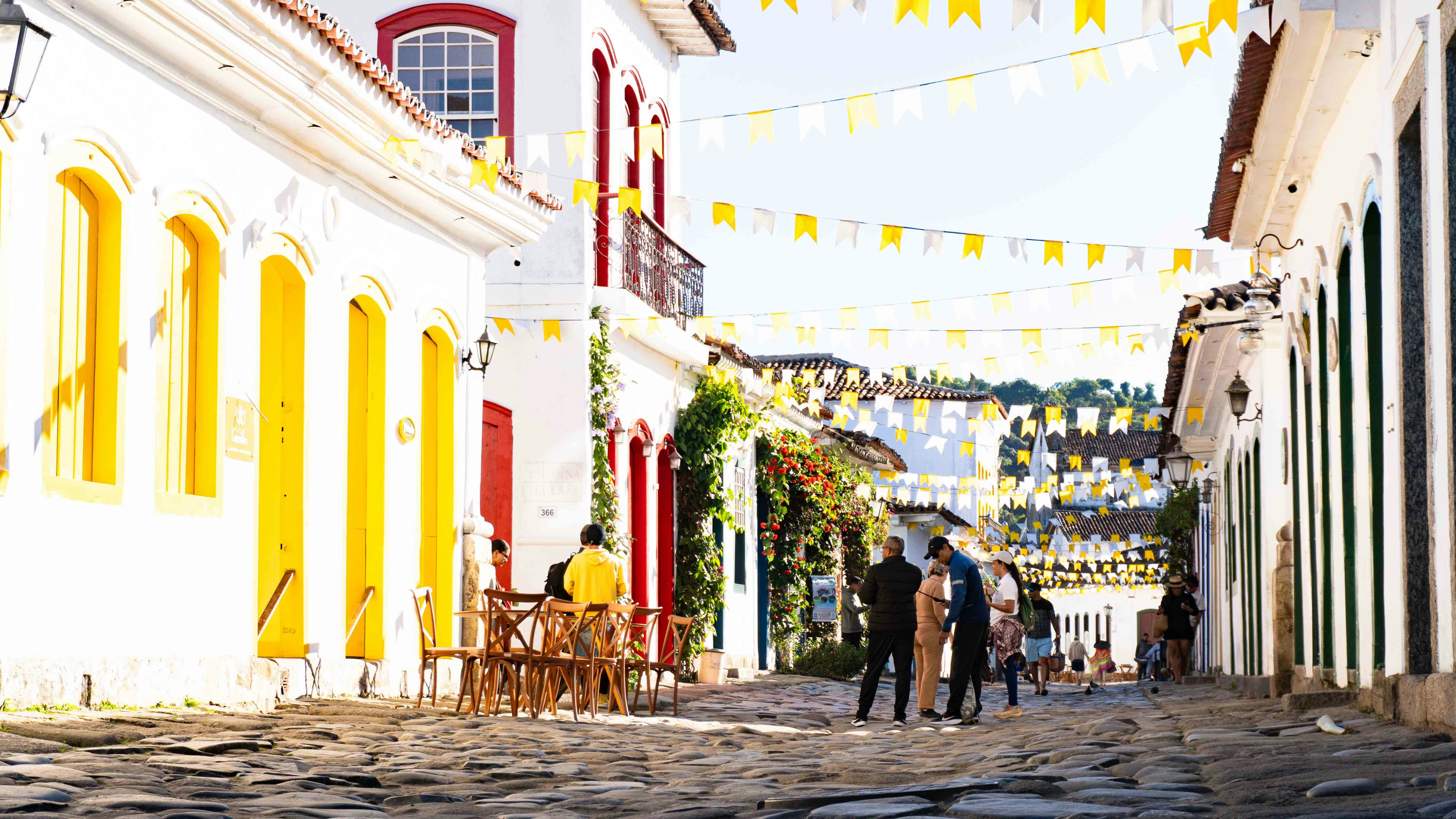 Sunlit Calle of Color and Clouds