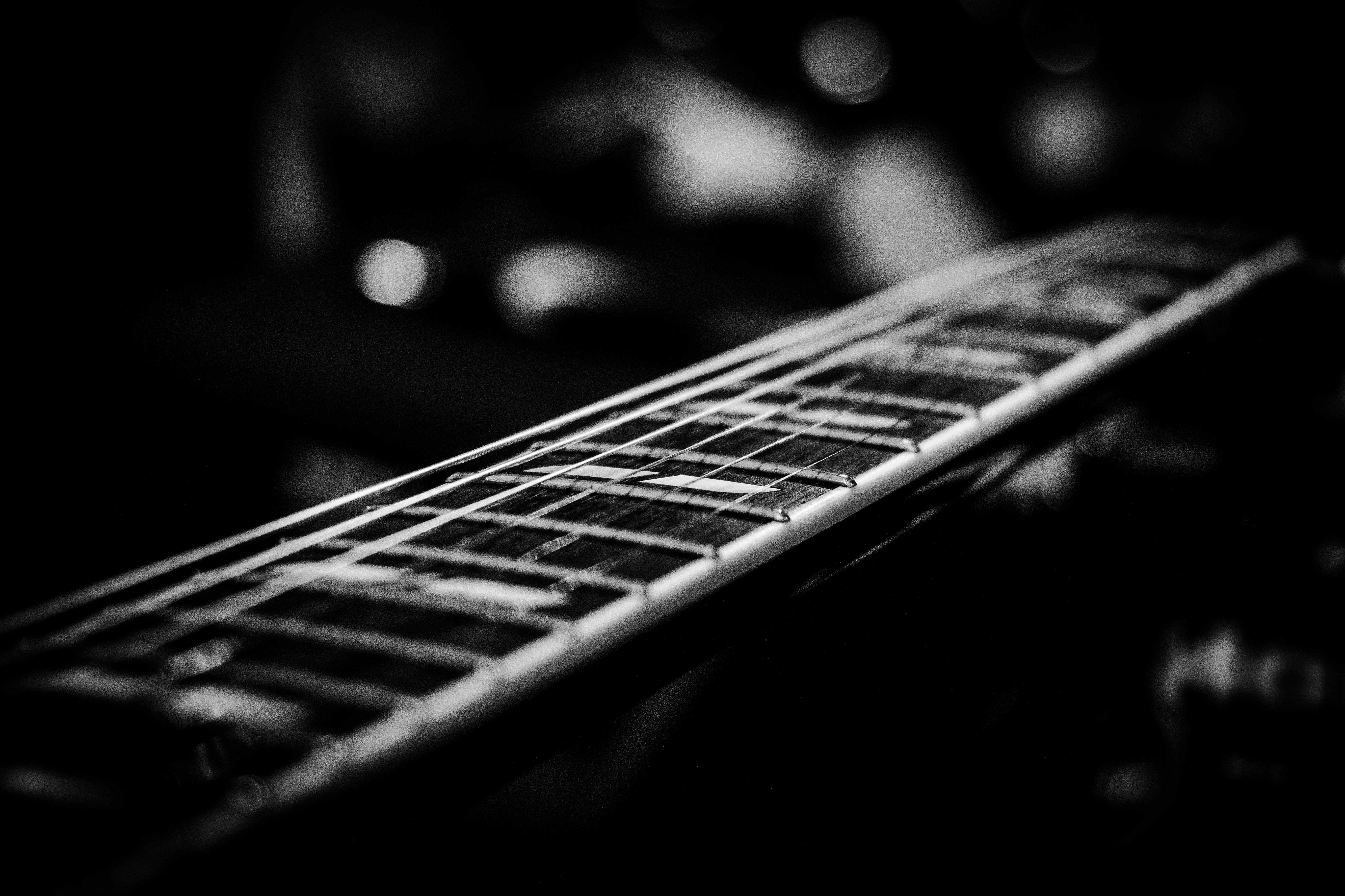 Guitar Neck in Focus: A Mono Chrome Glow