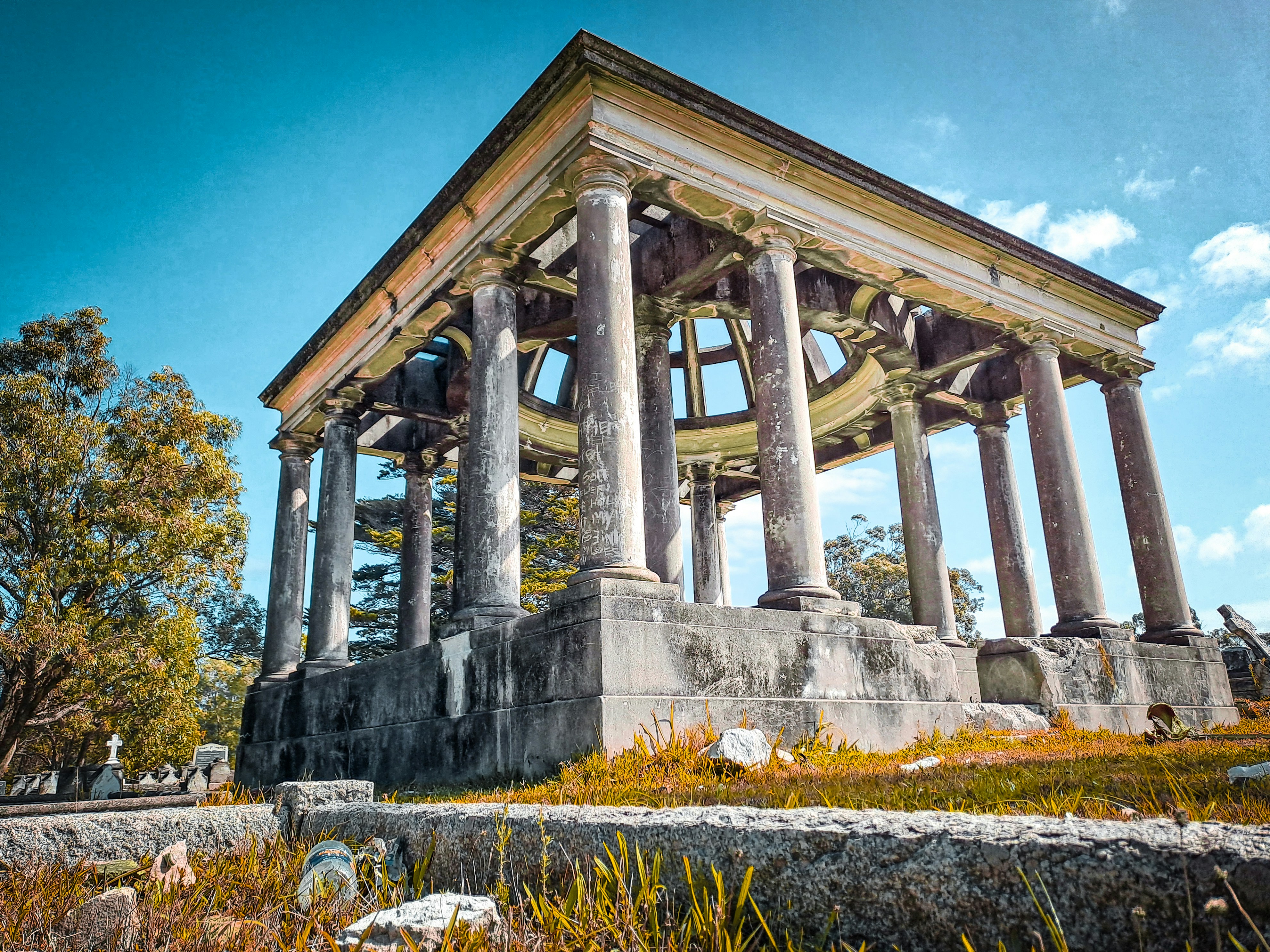 Colonnade in Stone: A Sunlit Timeless Shrine