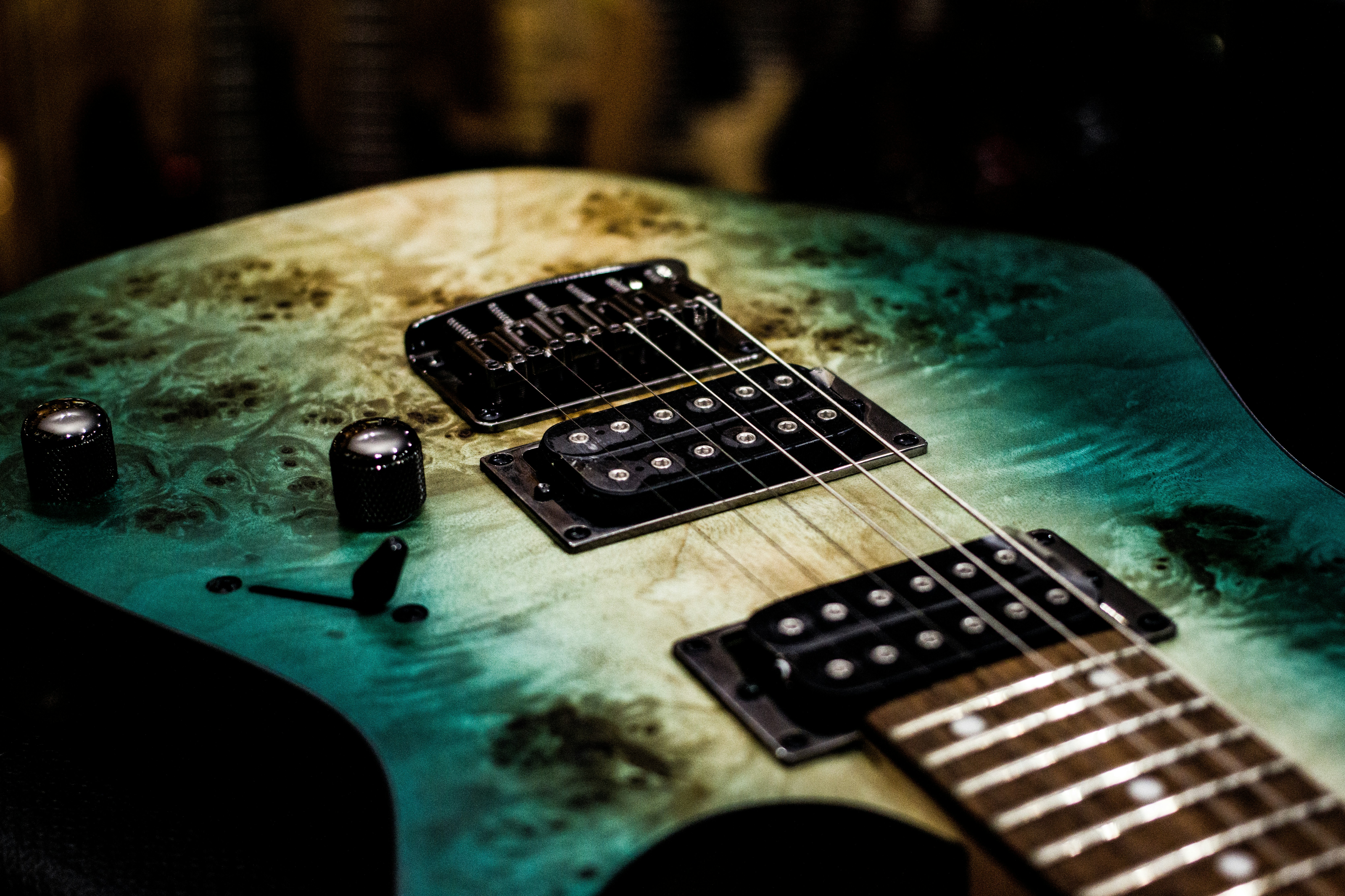 Aqua Burst: Electric Guitar with Weathered Aura