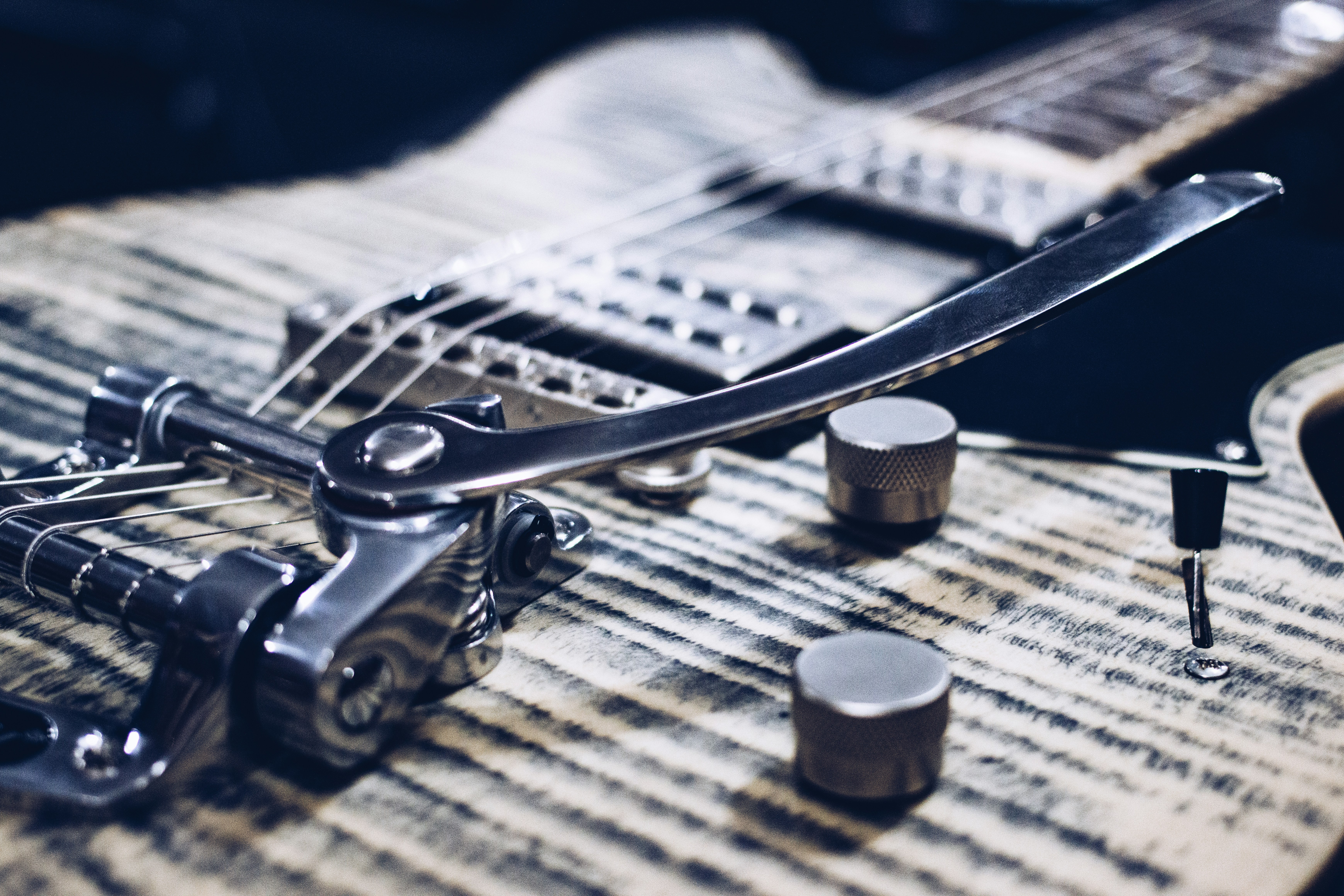 Chrome Bridge and String Tremolo on a Textured Electric Guitar