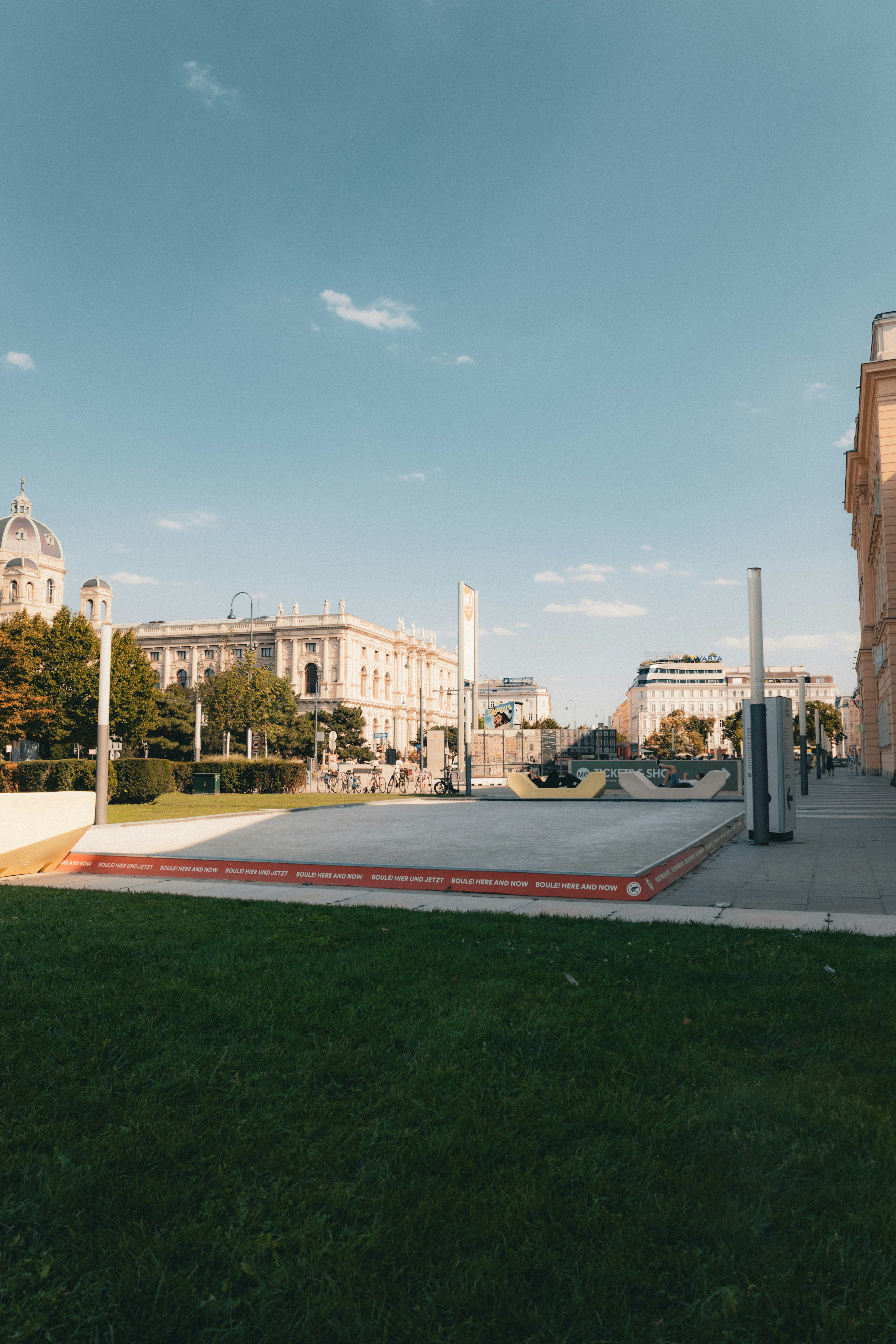 A public square with a flat concrete platform in Vienna, Austria