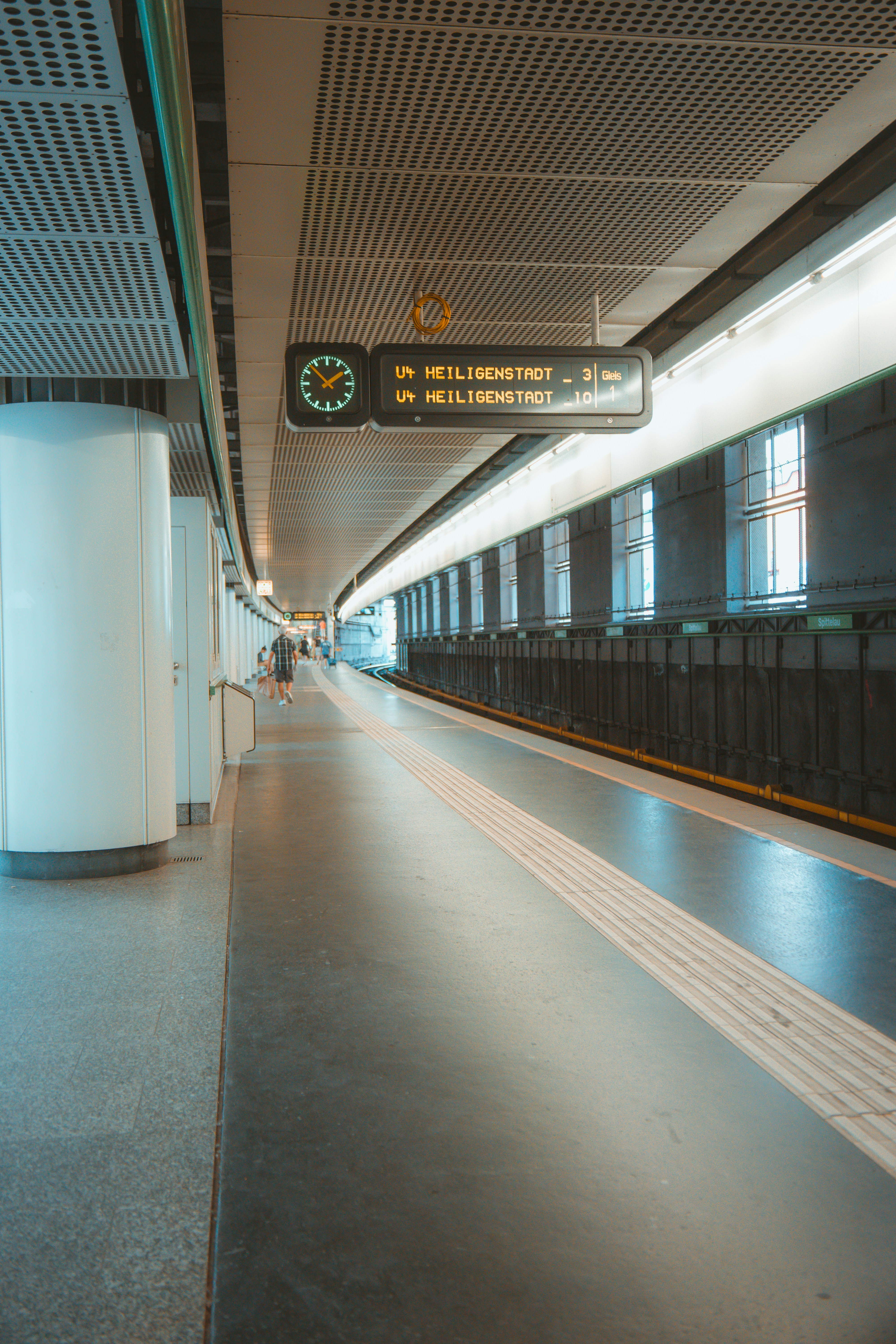 A Quiet Transit Moment: Empty Platform Under Soft Neon Light