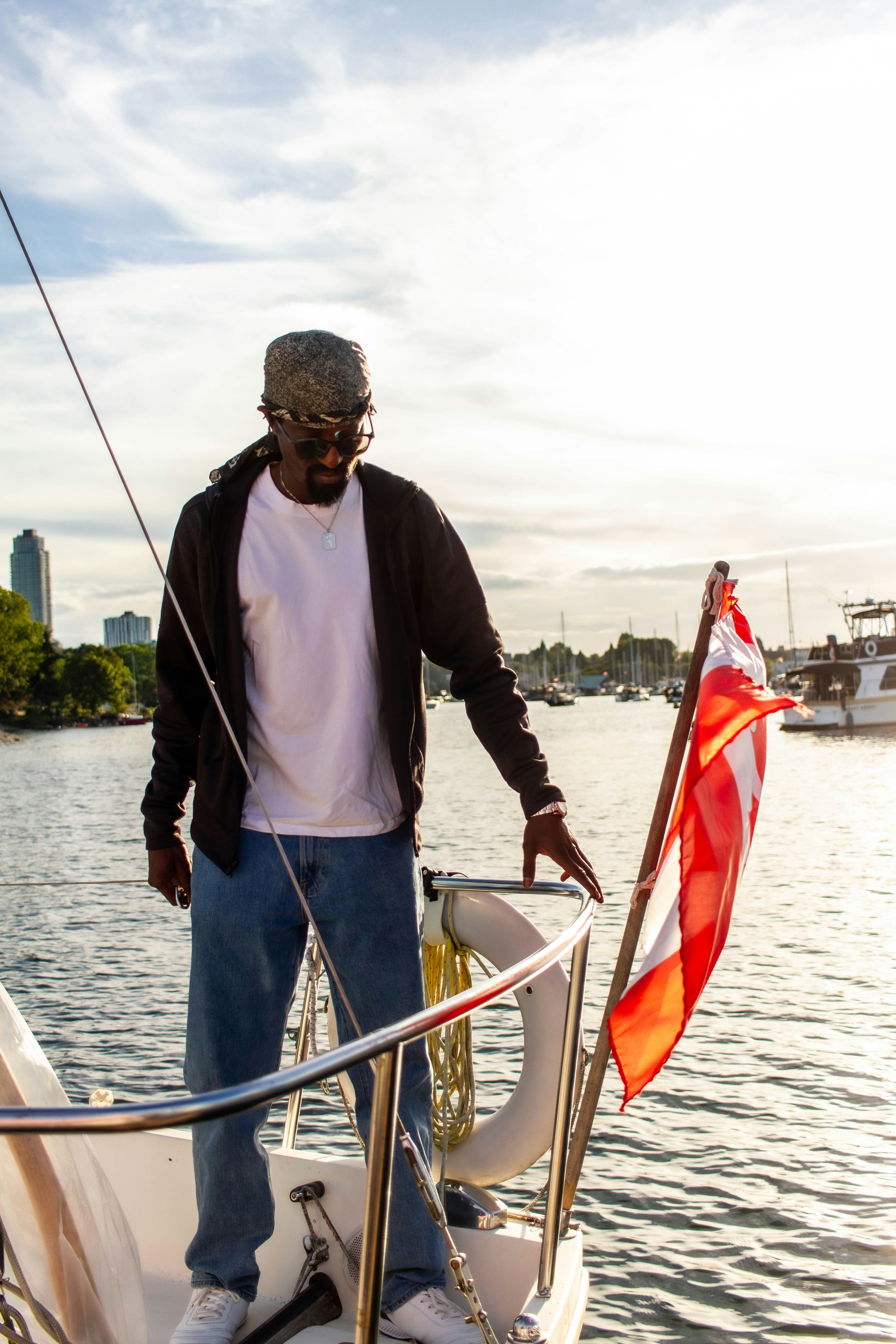 Sailor at Dusk: Quiet Confidence at the Deck Gate