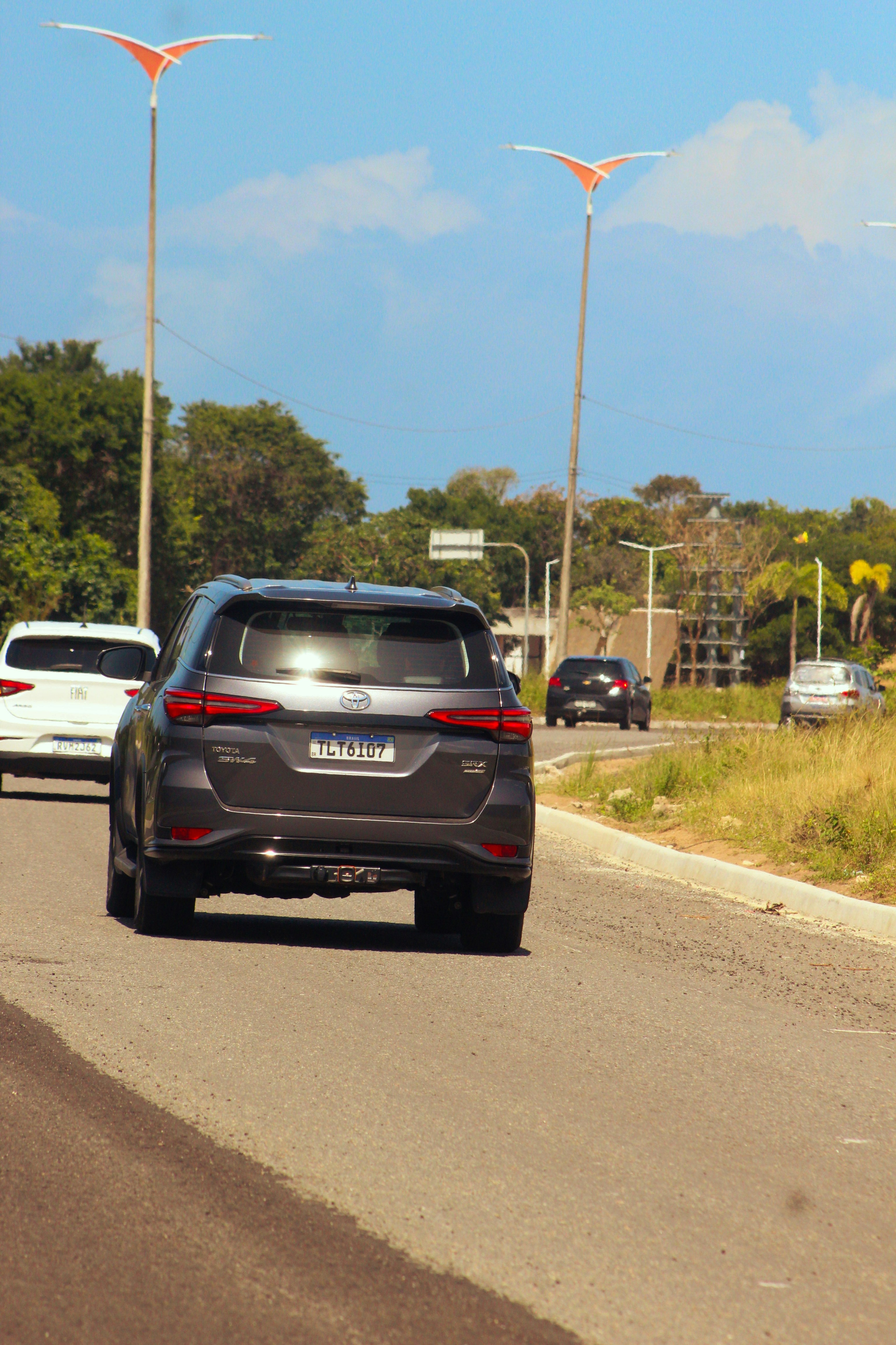 Rear-View Road Pulse: SUV in the Slow Lane