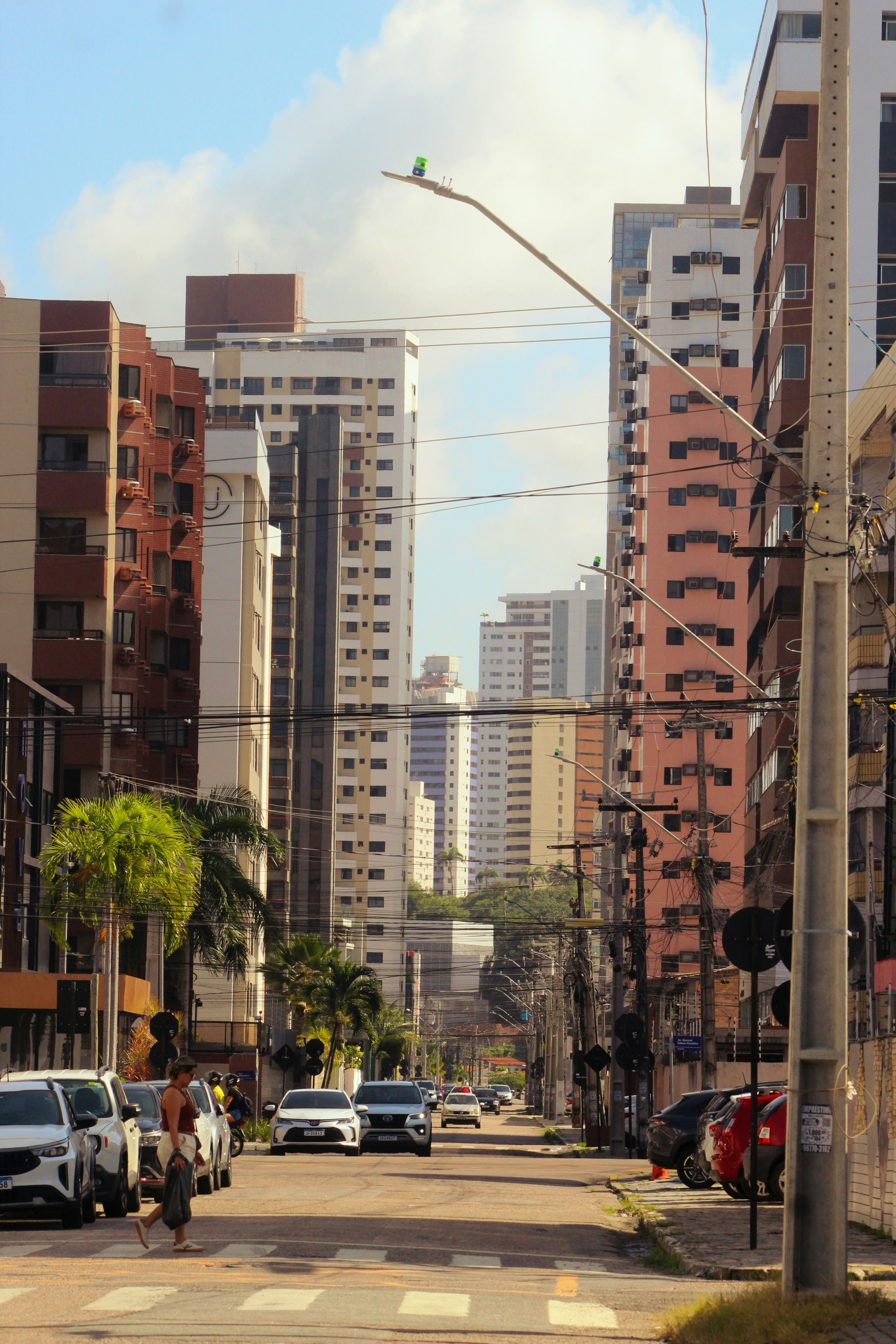 City Street Convergence: Tall Buildings Framing a Quiet Morning