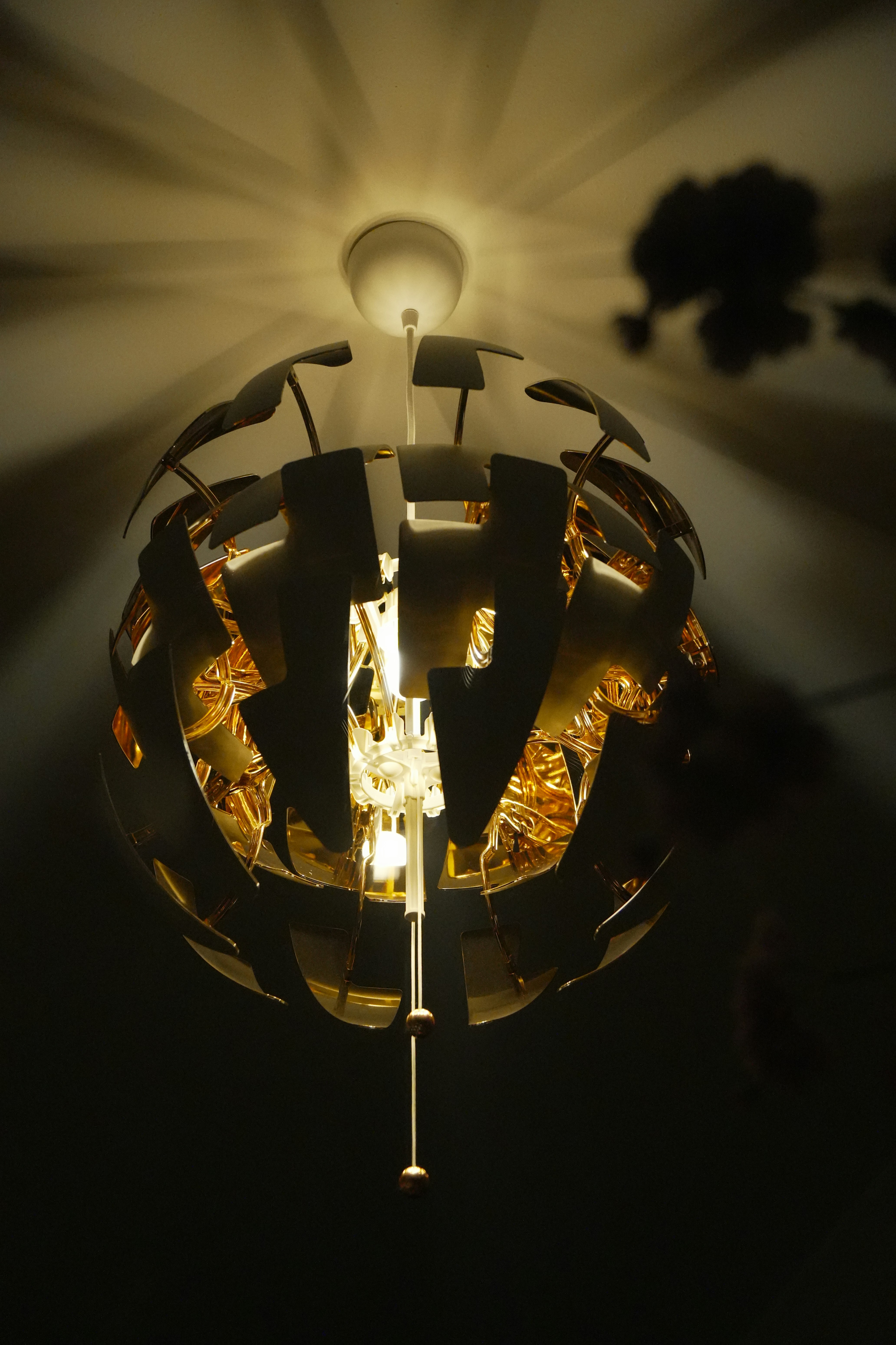 Orbital Light: A Geometric Lamp Refracting Darkness