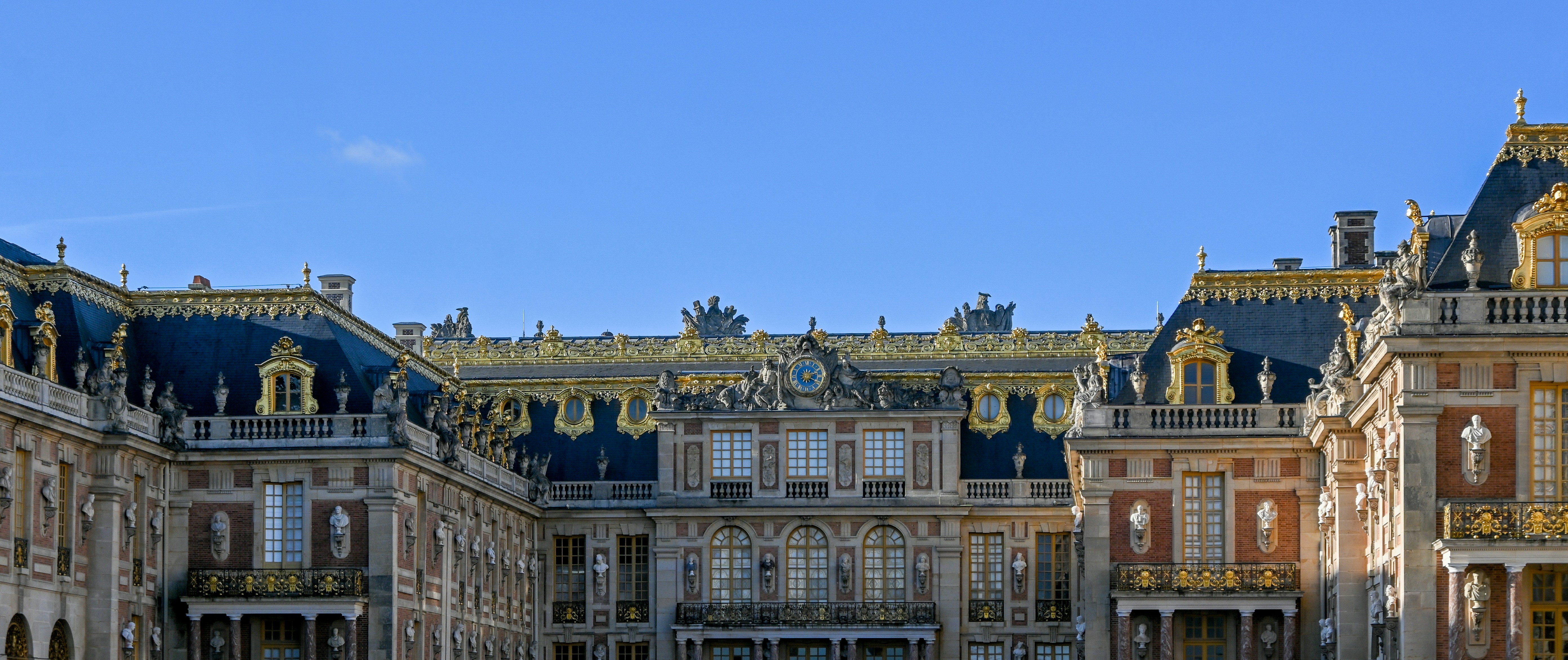 Ornate Palace Facade Framed by a Clear Sky