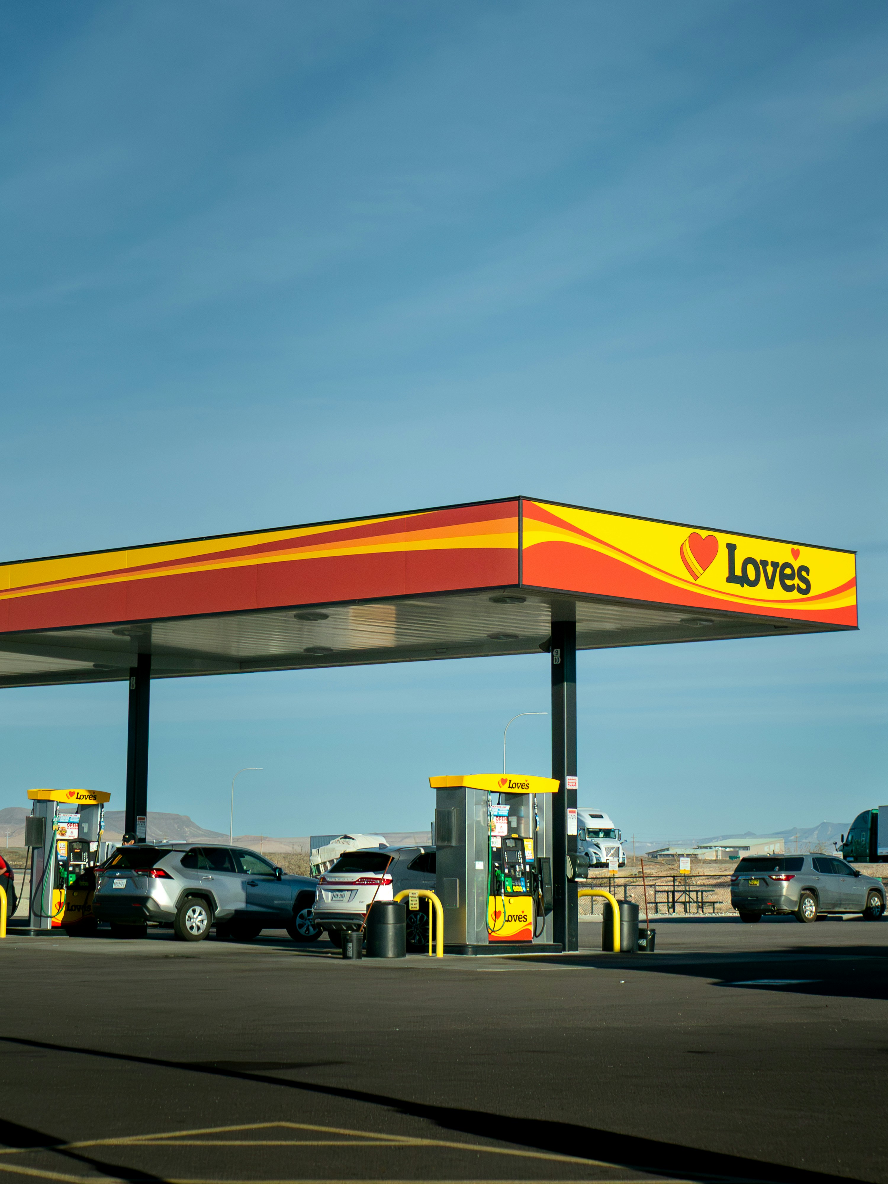 Bright Haven at the Pump: Love’s Corner Under a Clear Sky