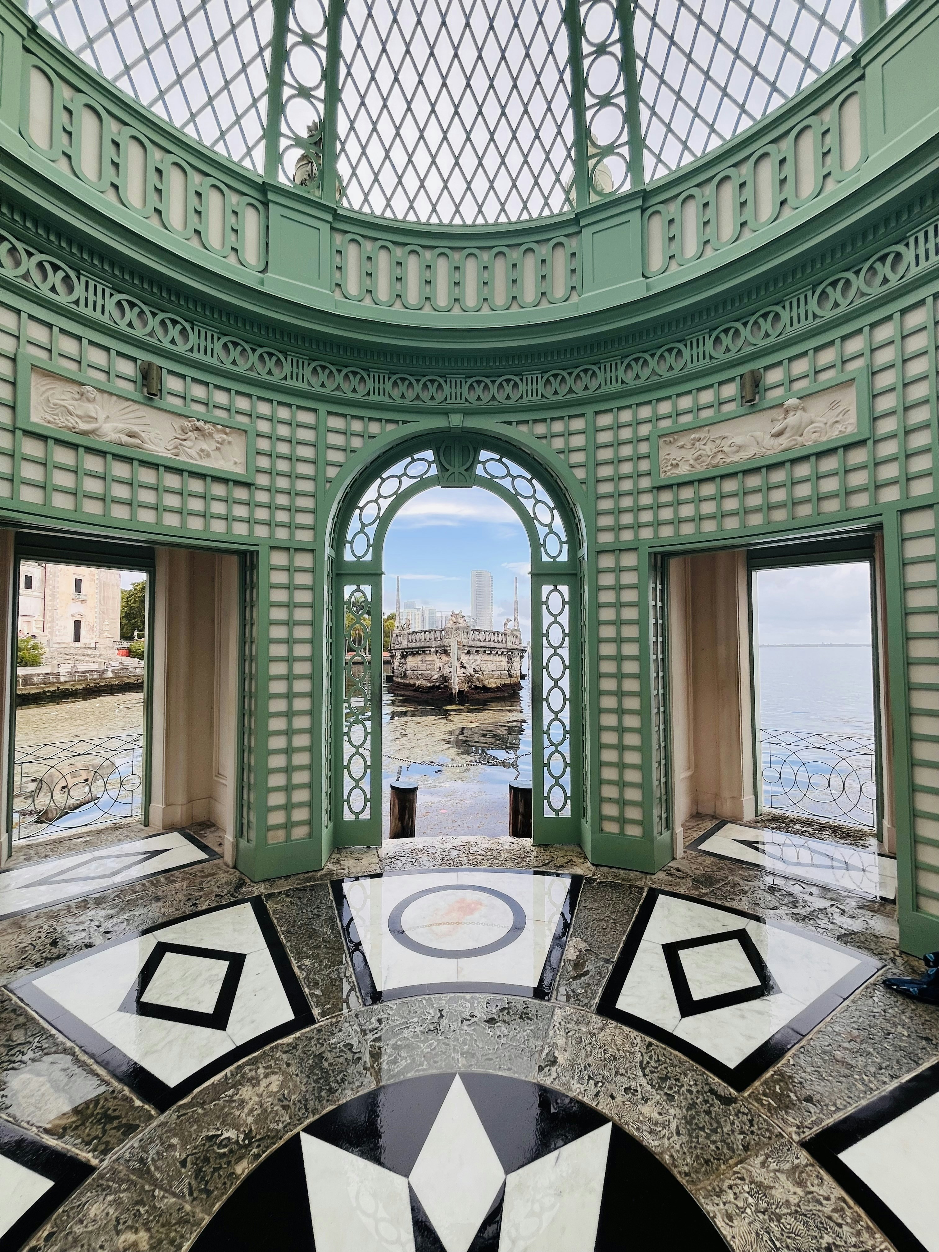 Verdant Archway Overlooking a Marble Mosaic Sea