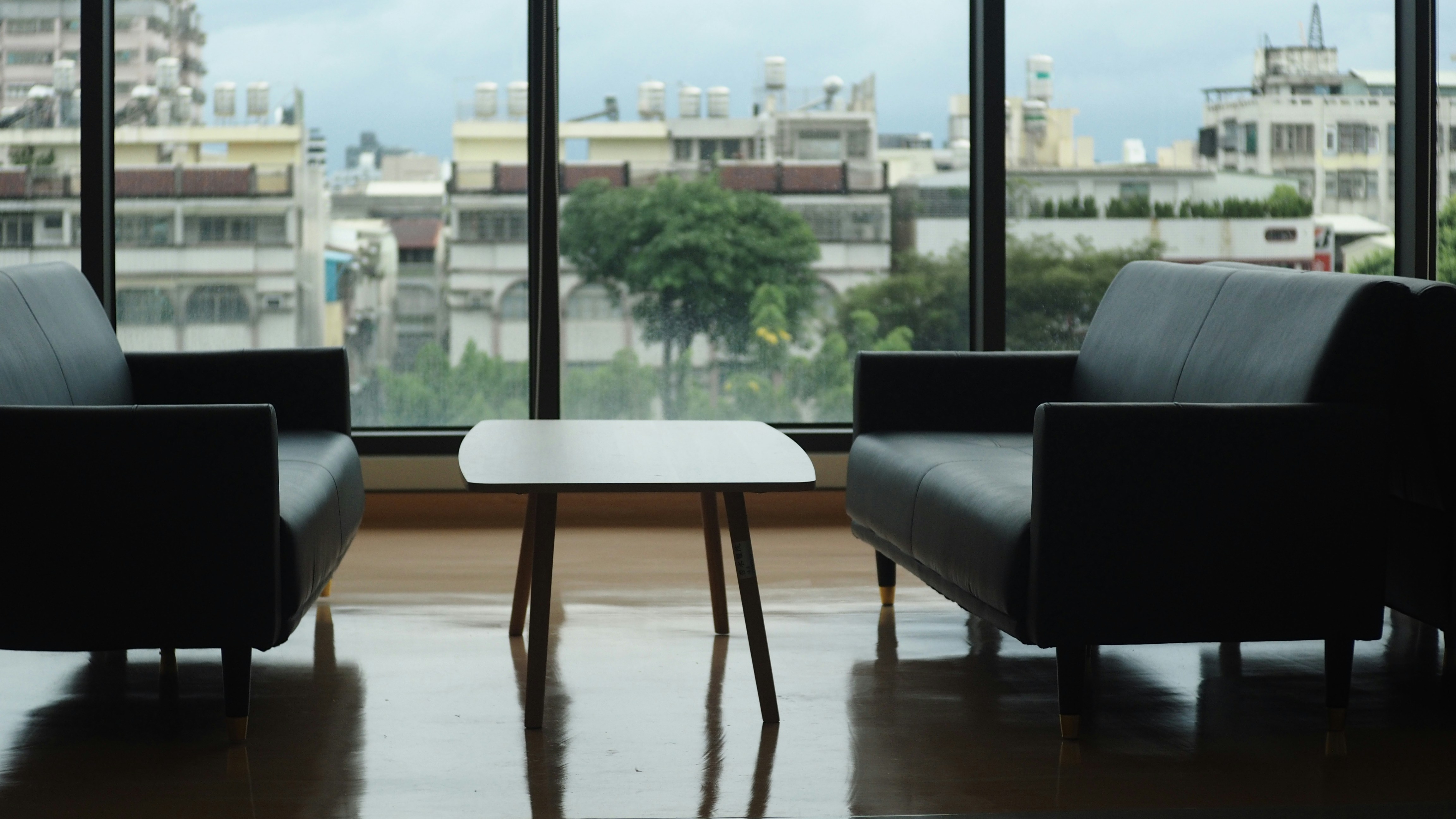 Sunlit Lounge Through a Wide Window