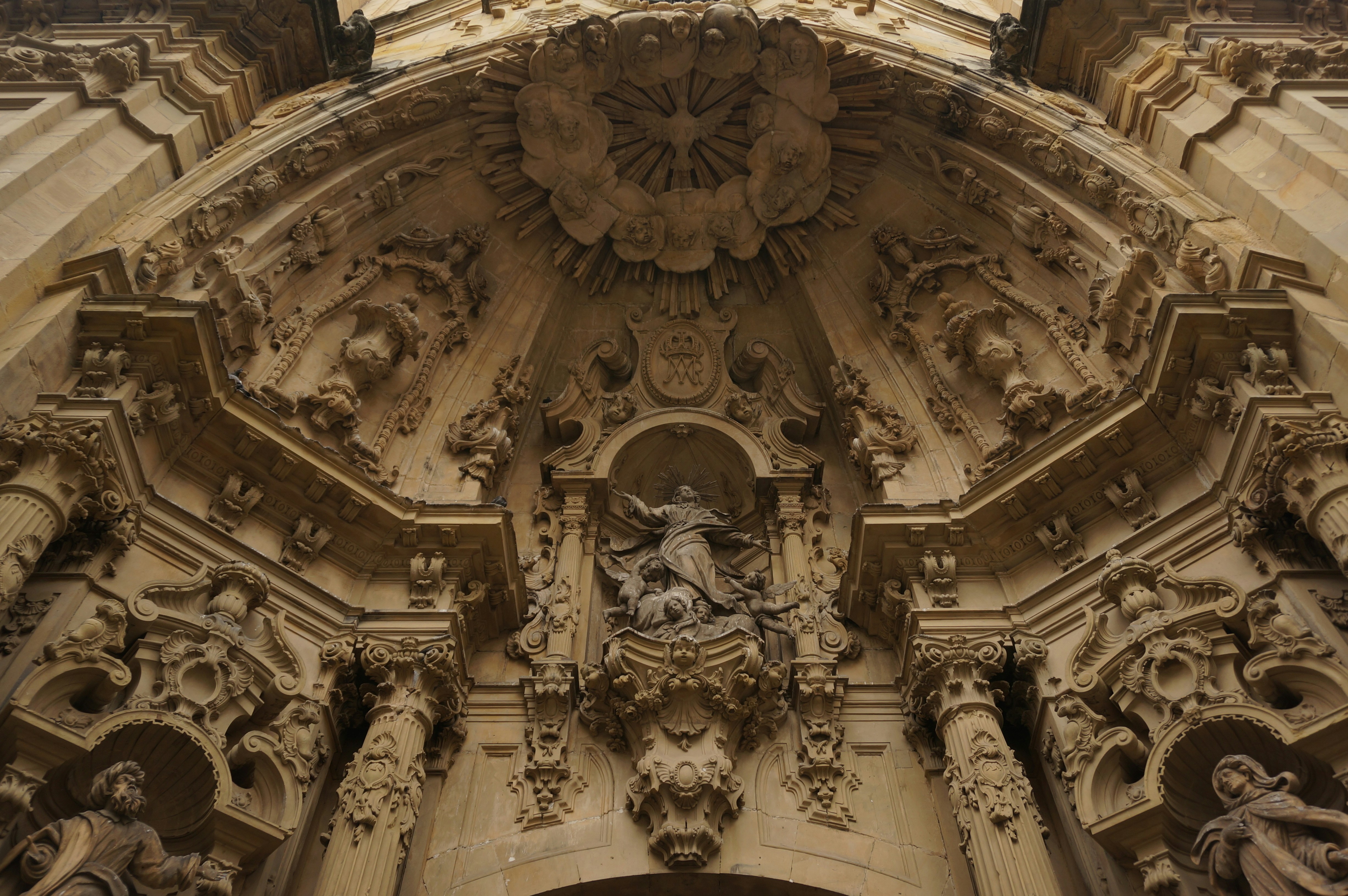 Intricate Baroque Facade: Carved Stone Choir of Shadows