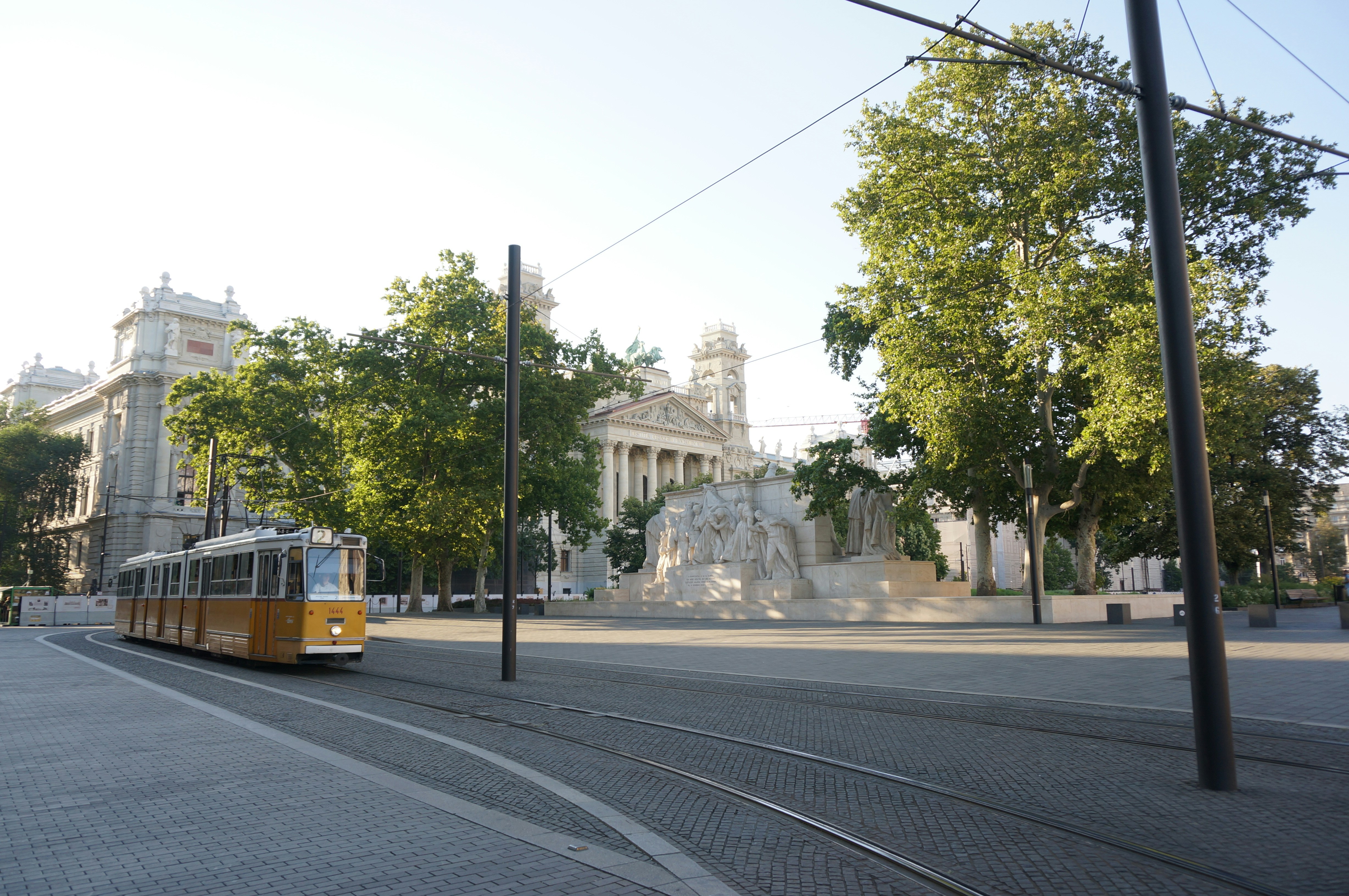 Golden tram at the neoclassical square