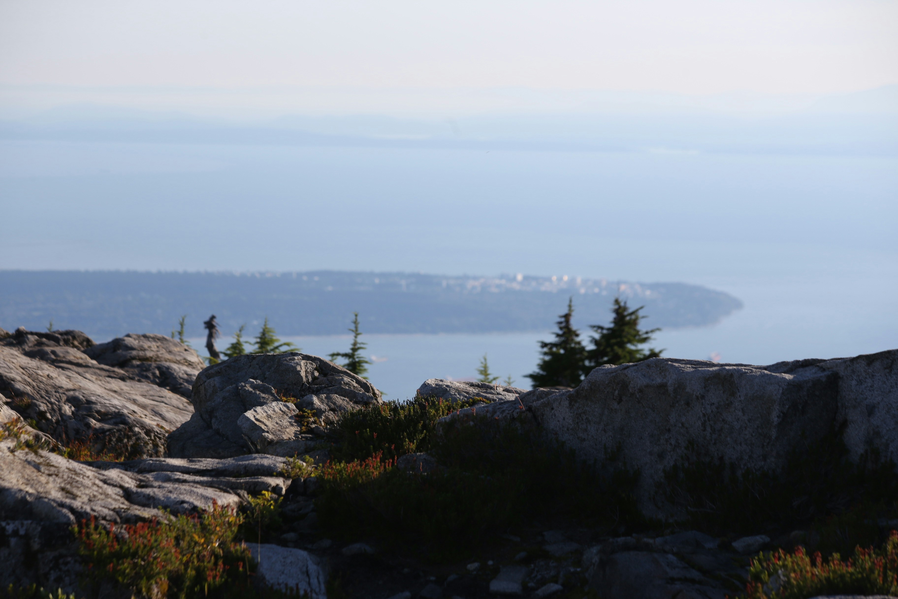 Cliffside Overlook: Figures on the Horizon