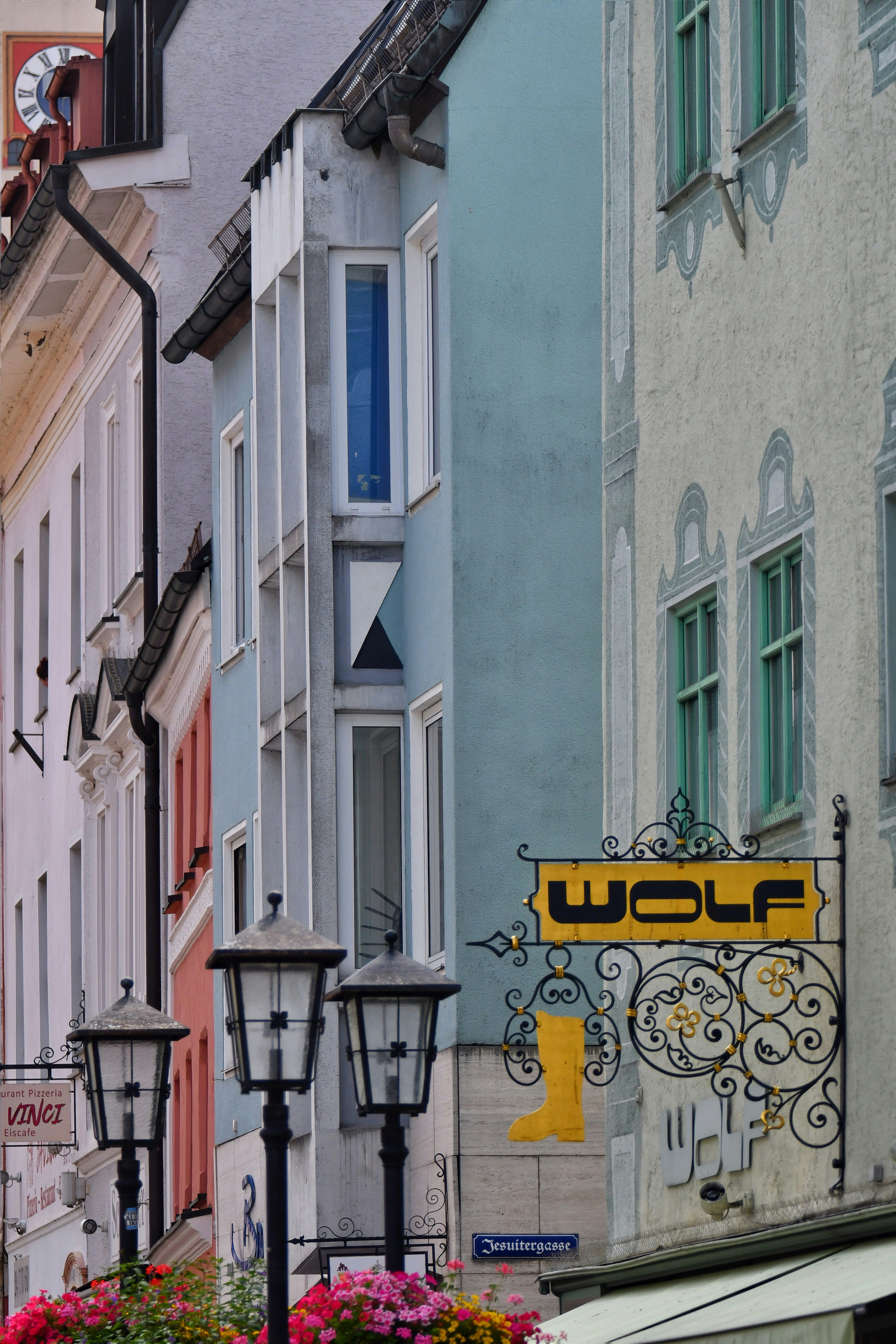 Colorful European Street Fascade with Ornate Wolf Sign