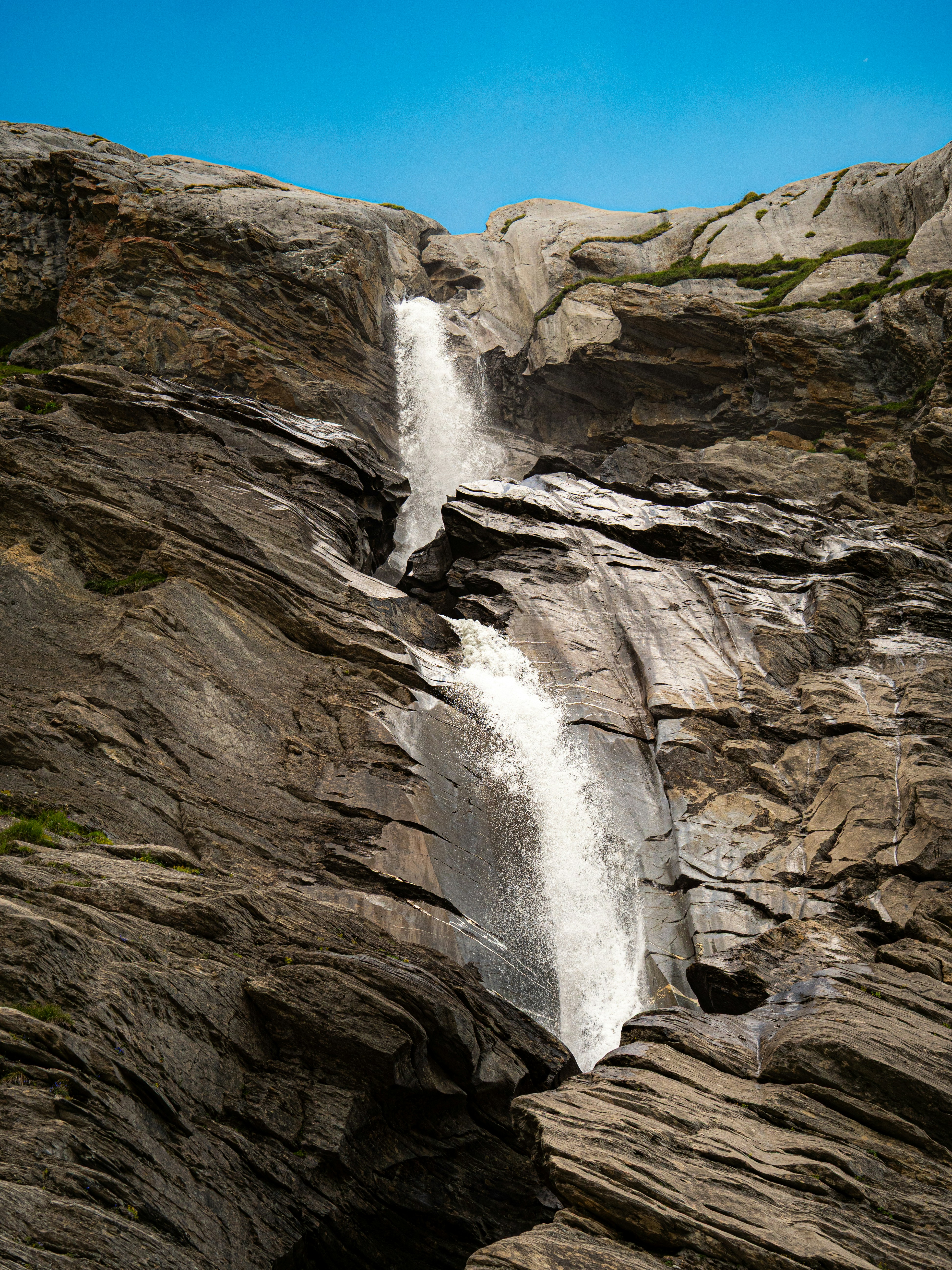 Vertical Cascade: A Narrow Gorge Falls in Stark Rock
