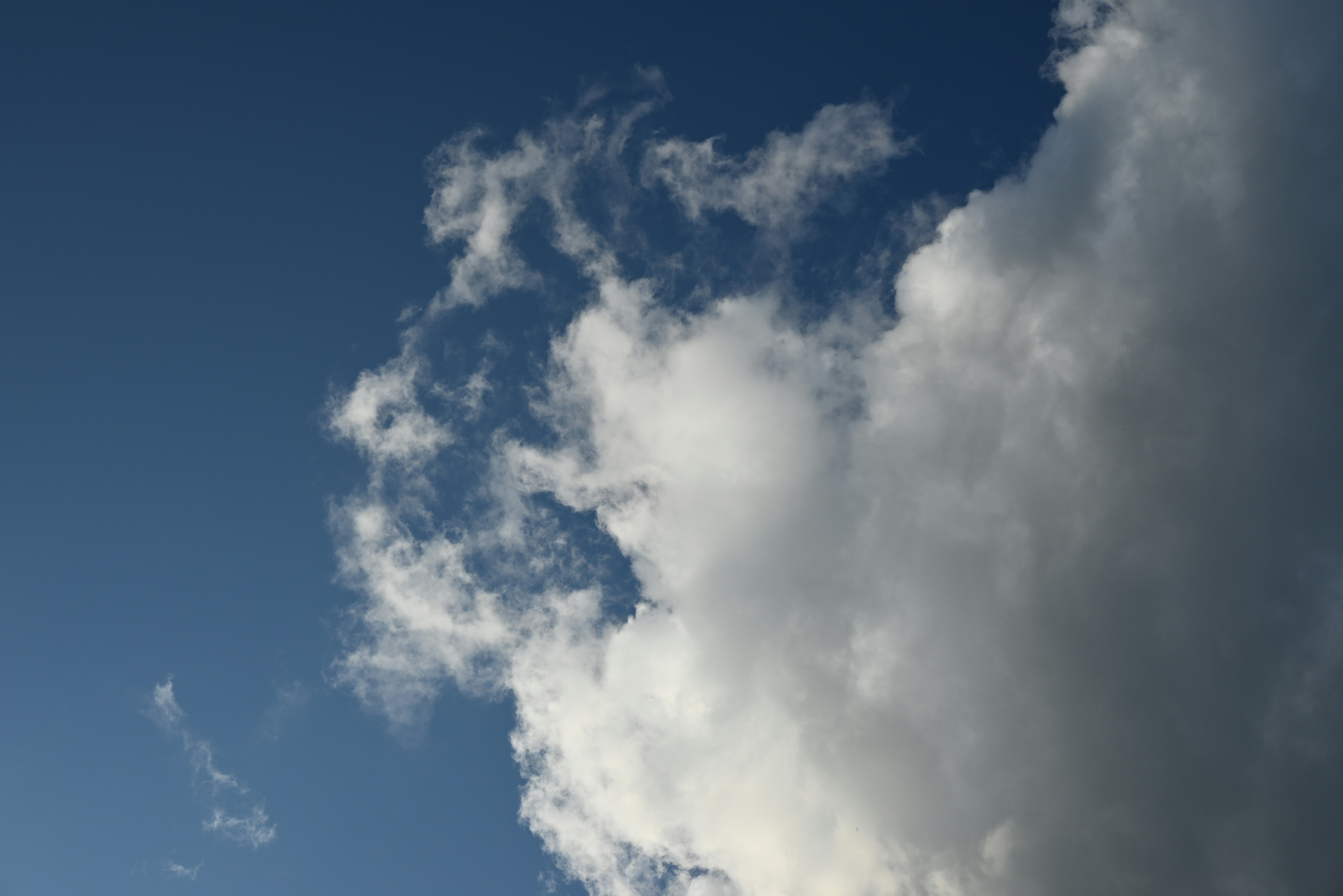 Azure Gaze: A Luminous Cloud Skies Break