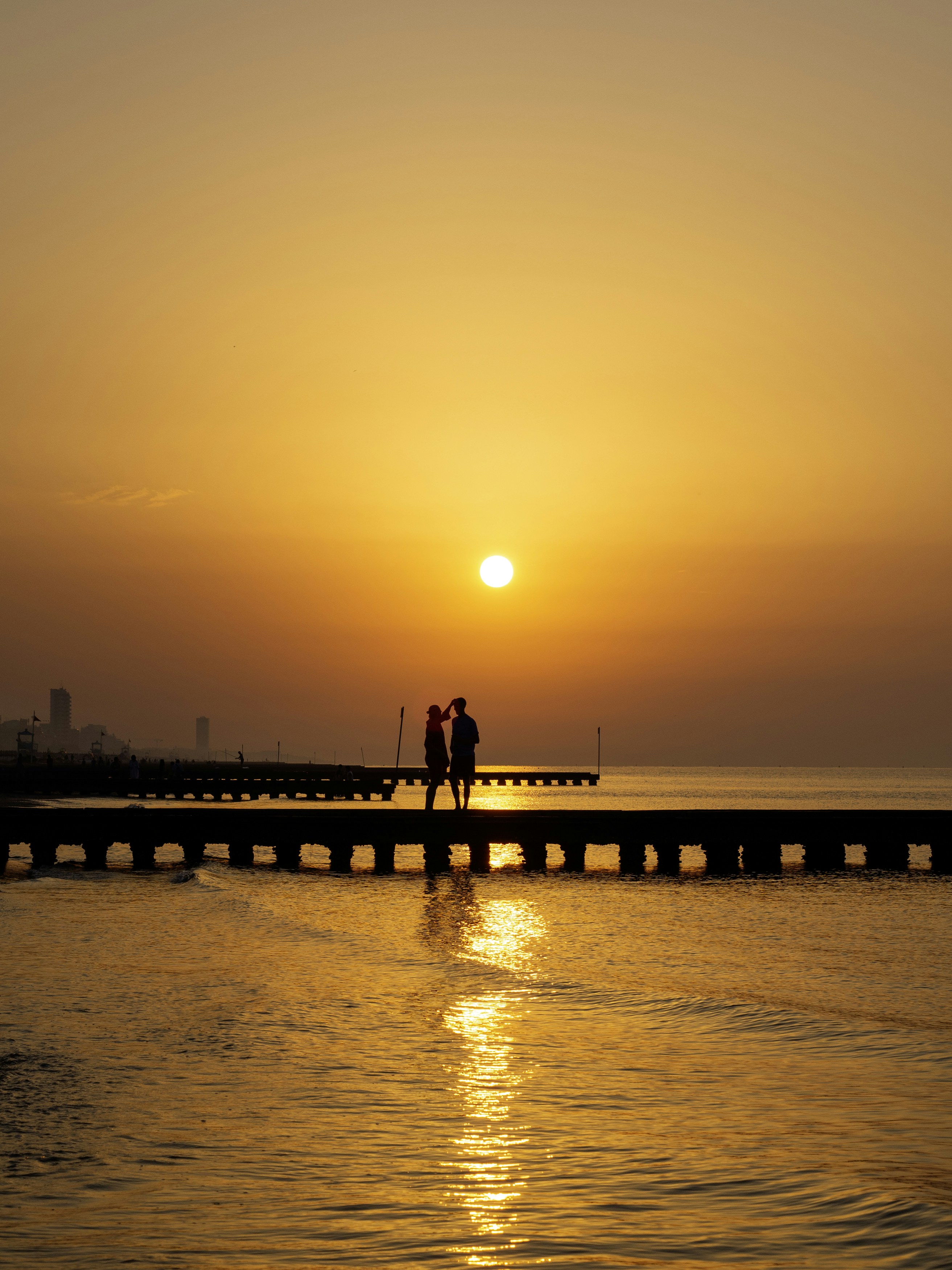 Sunset Kiss on the Pier