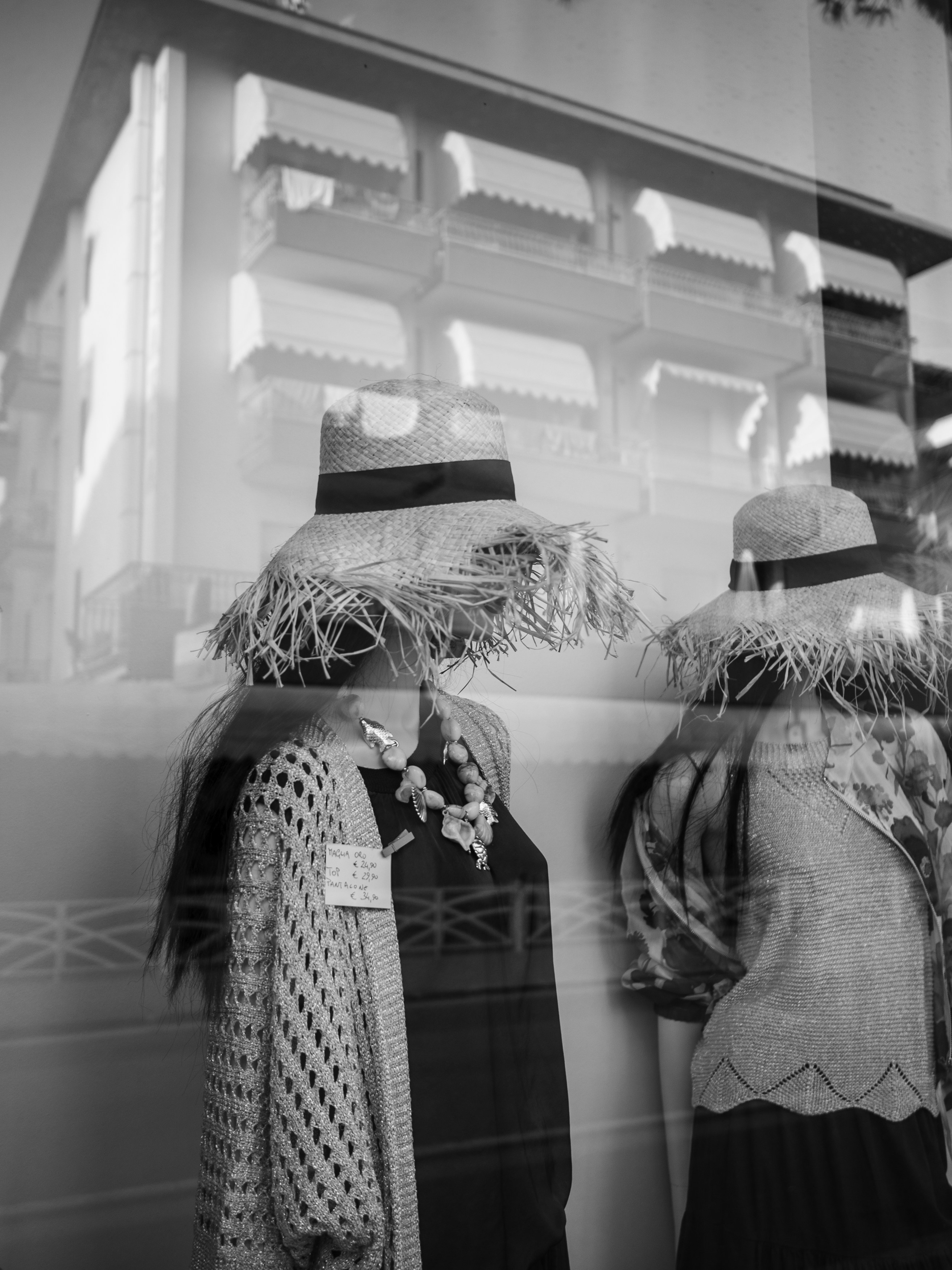 Echoes of Fashion: Reflections on a Window Scene