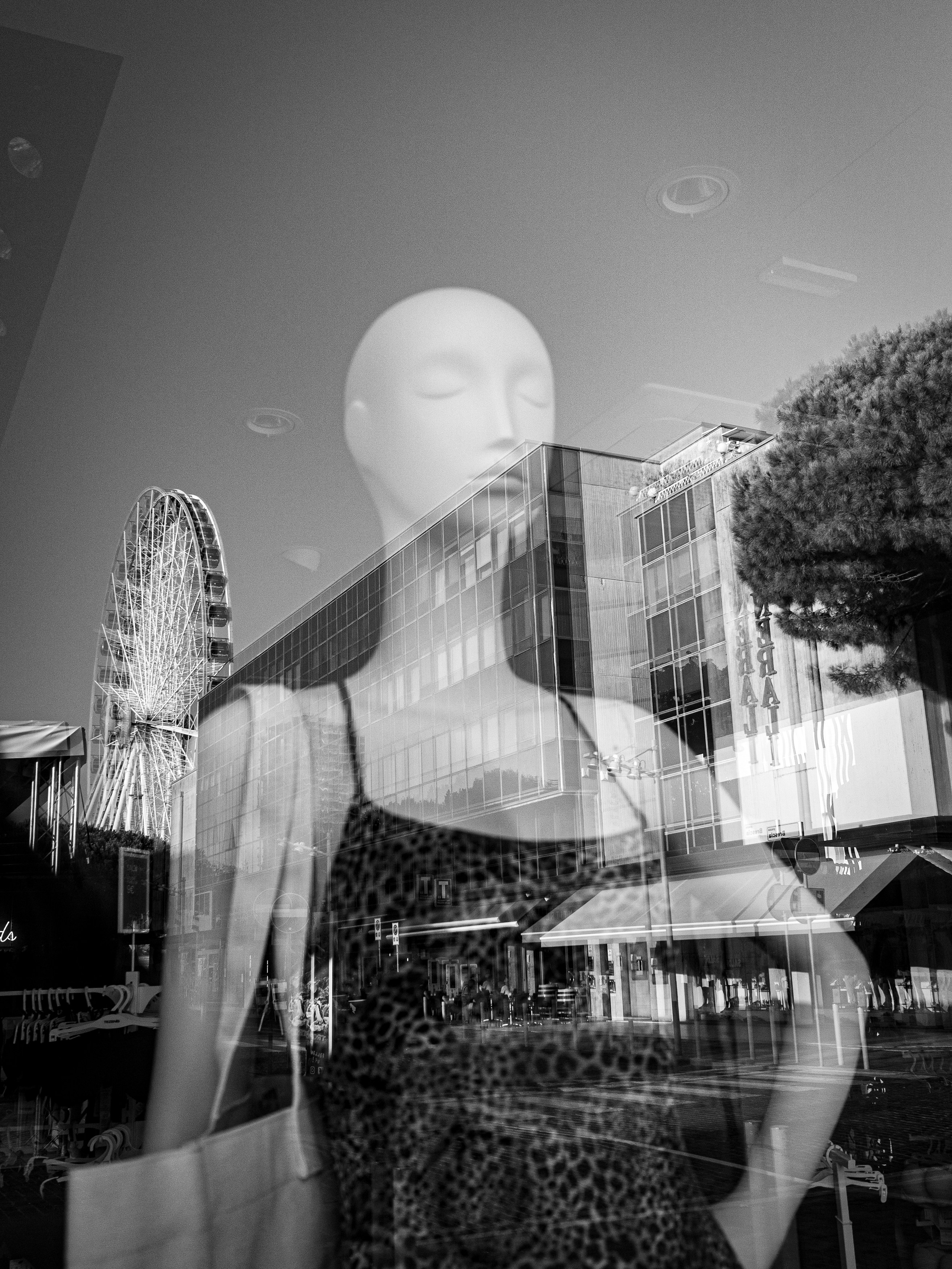 Reflective Echo: A Fashion Glimpse Within an Urban Glass World