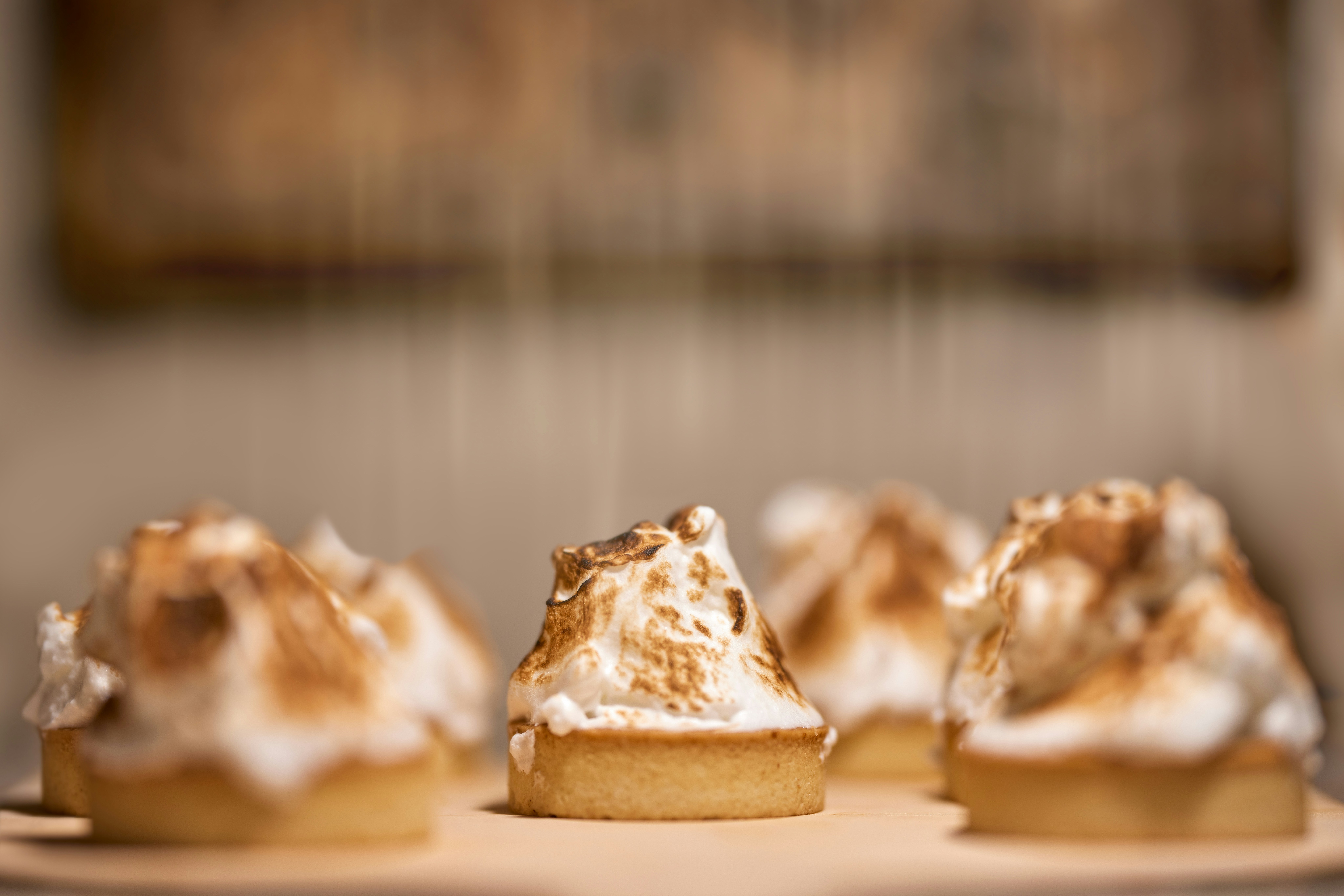 Cream-Topped Confections in a Soft-Focused Display
