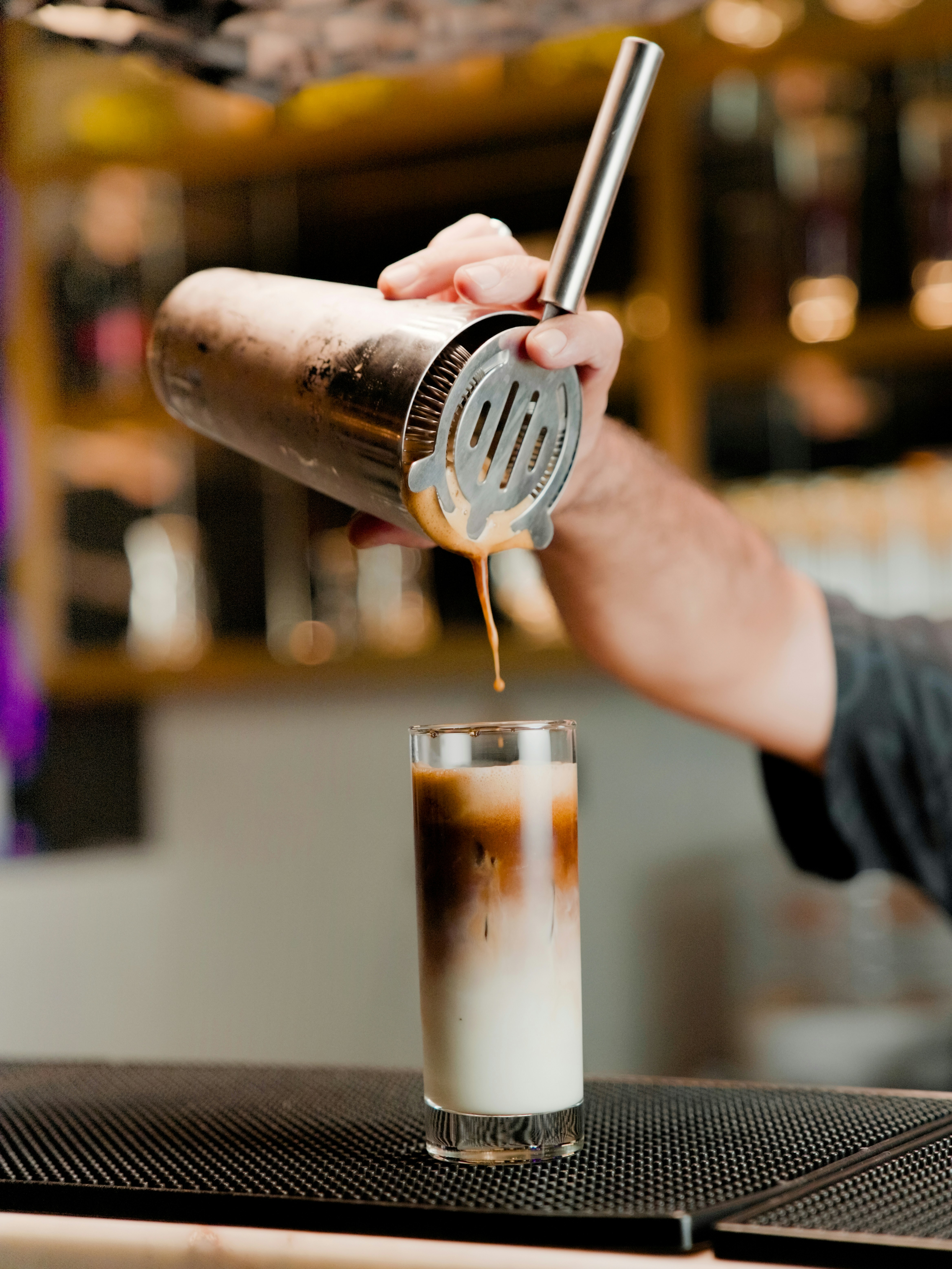 Creamy Cortado Cascade: Handcrafted Latte Art in Motion