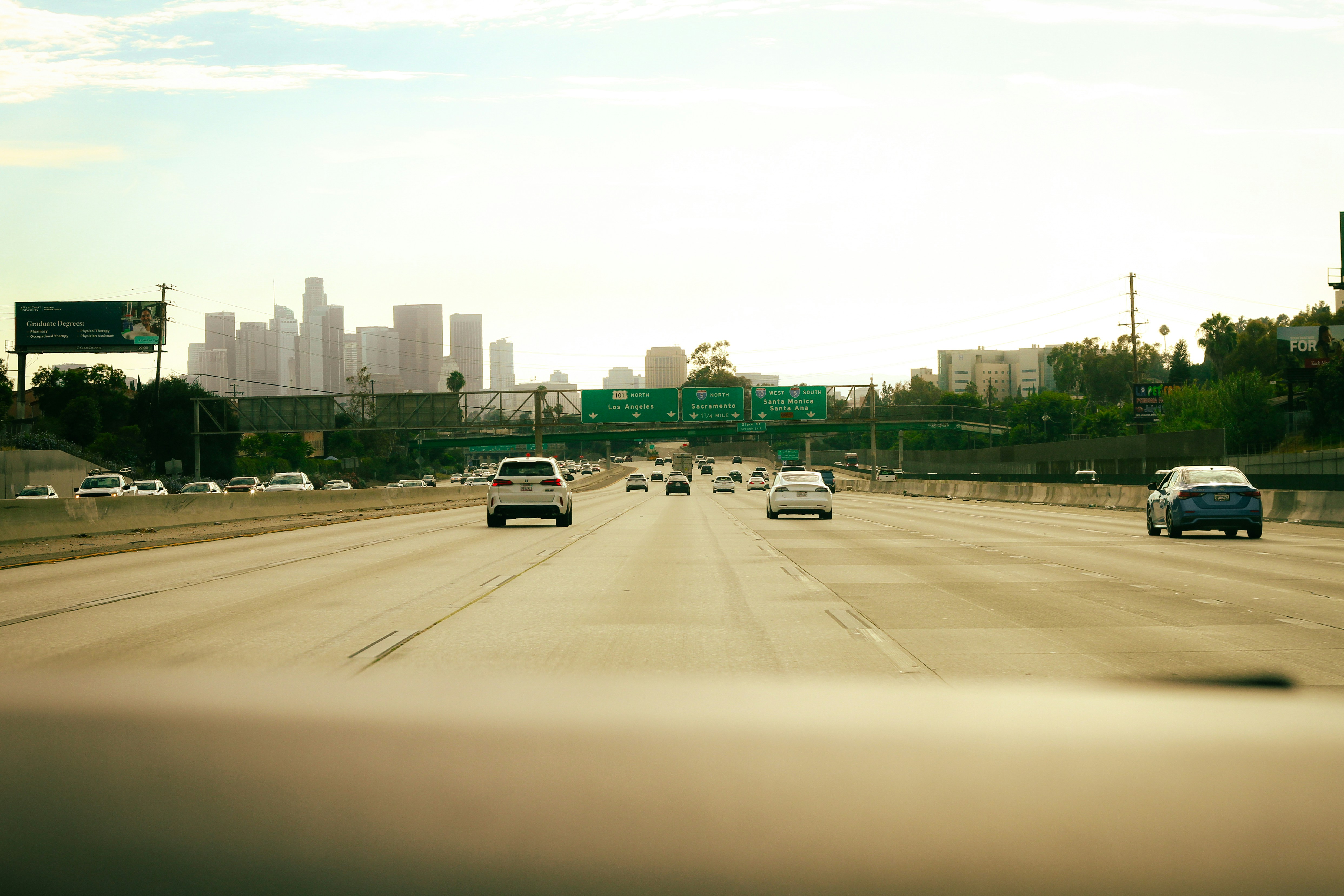 Urban Highway Convergence: Morning Light Over the City