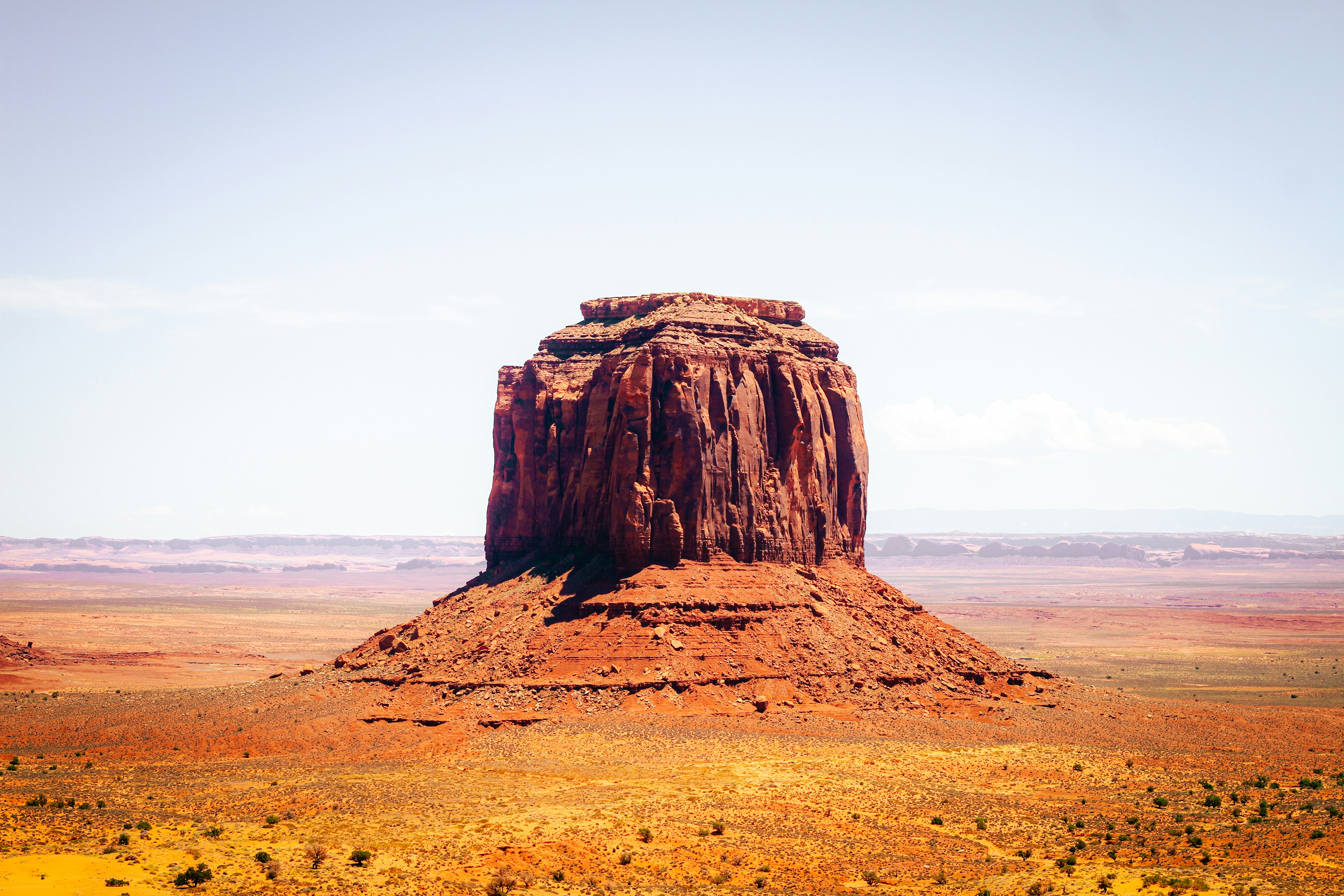 Monolithic Mesa Rising from Desert Expanse