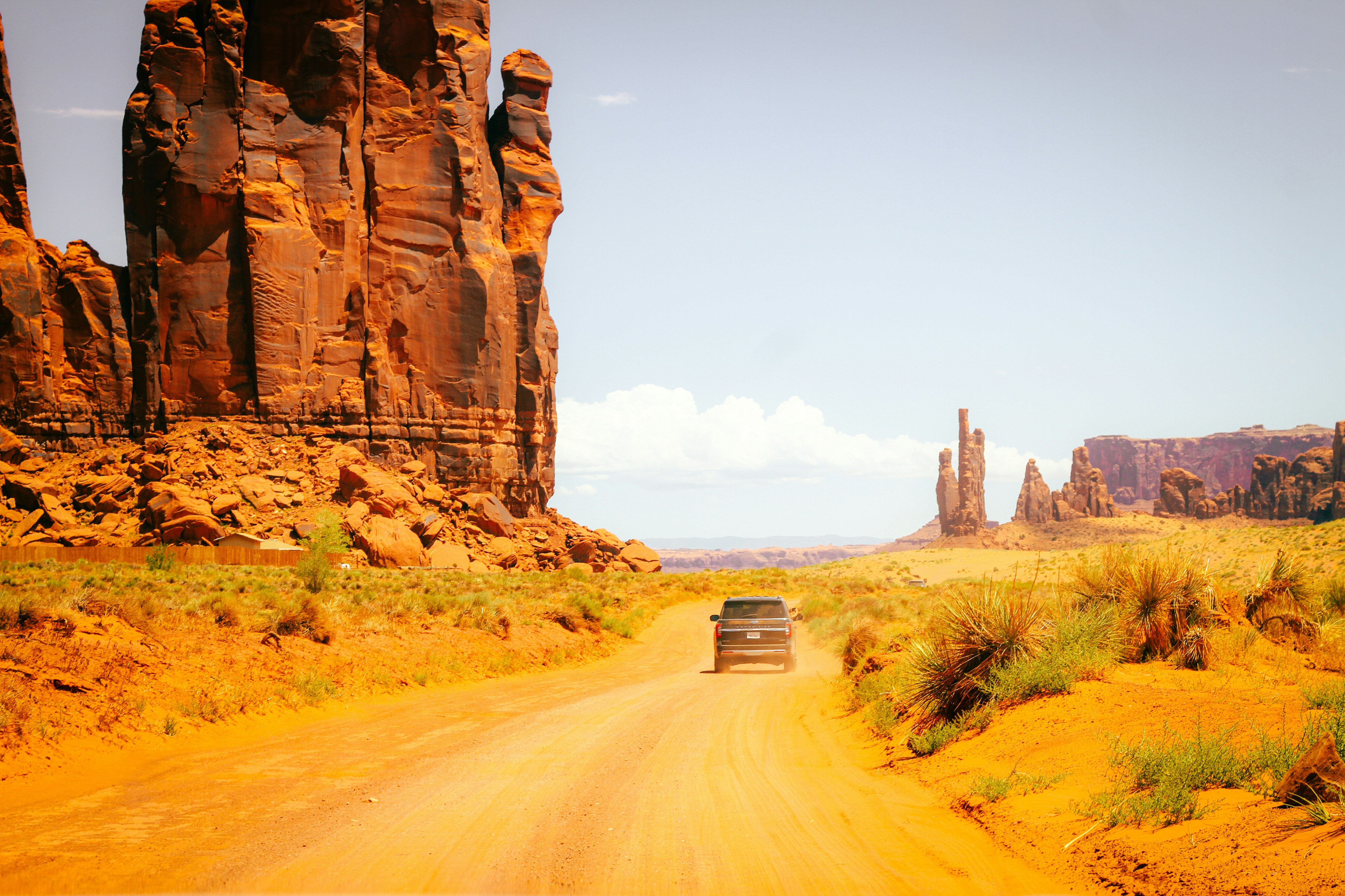 Dusty Road to the Towers: A Corridor Through Monument Valley-like Butte Vision