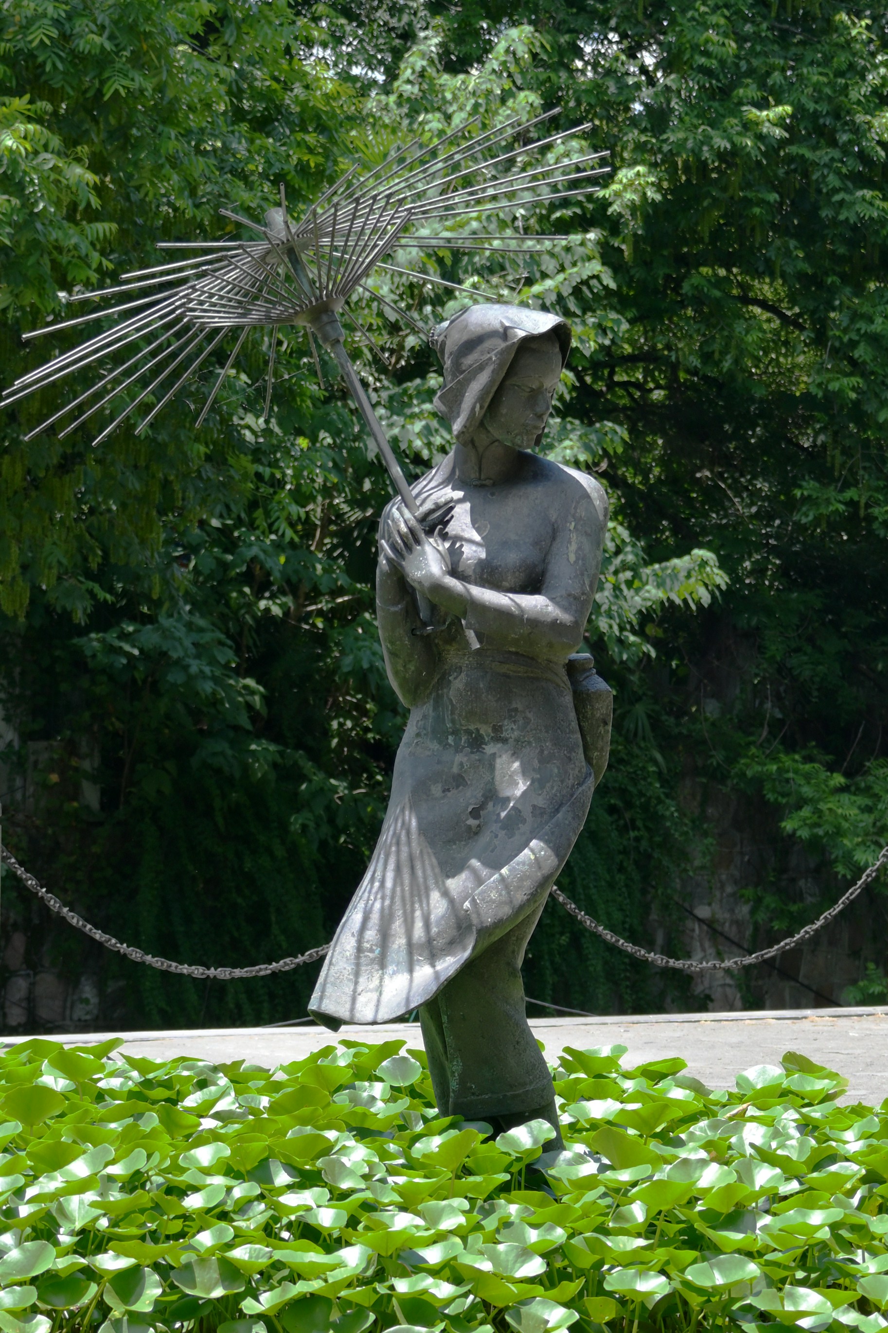 Silent Gardener with a Spoked Umbrella