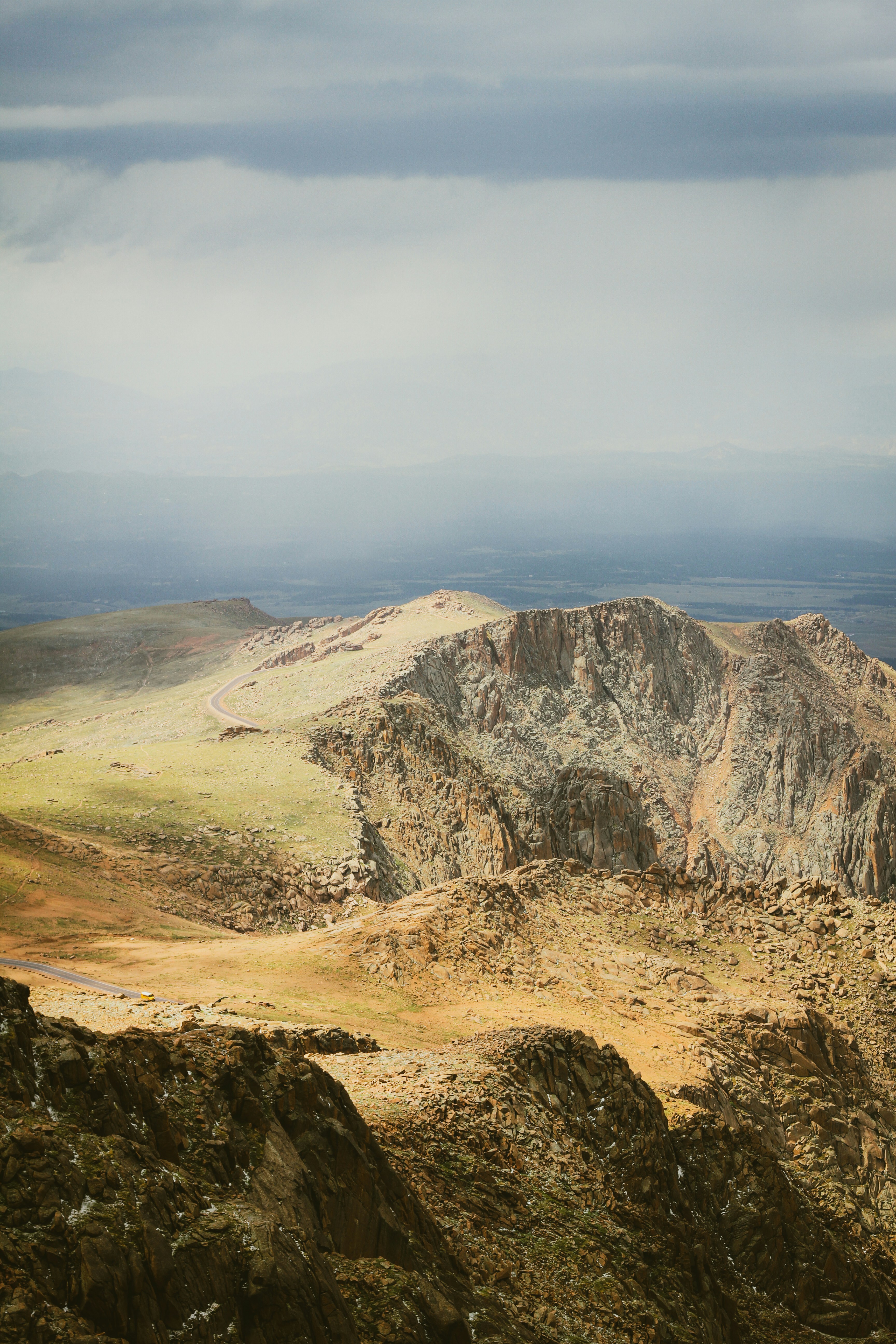 Ridge Sentinel: A Sky-Opening View Over Rugged Peaks